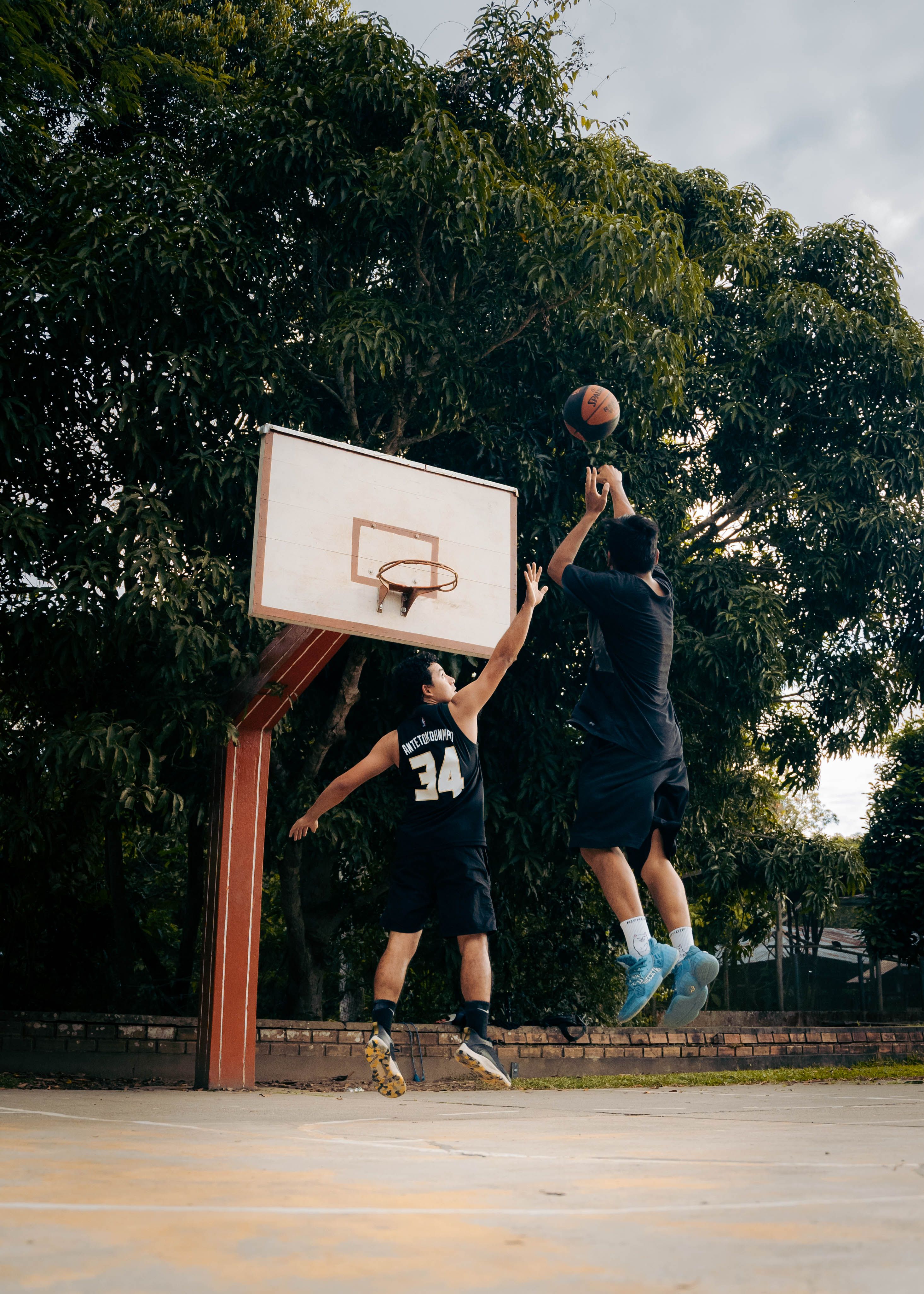 White and Grey Basketball Jersey Uniform · Free Stock Photo
