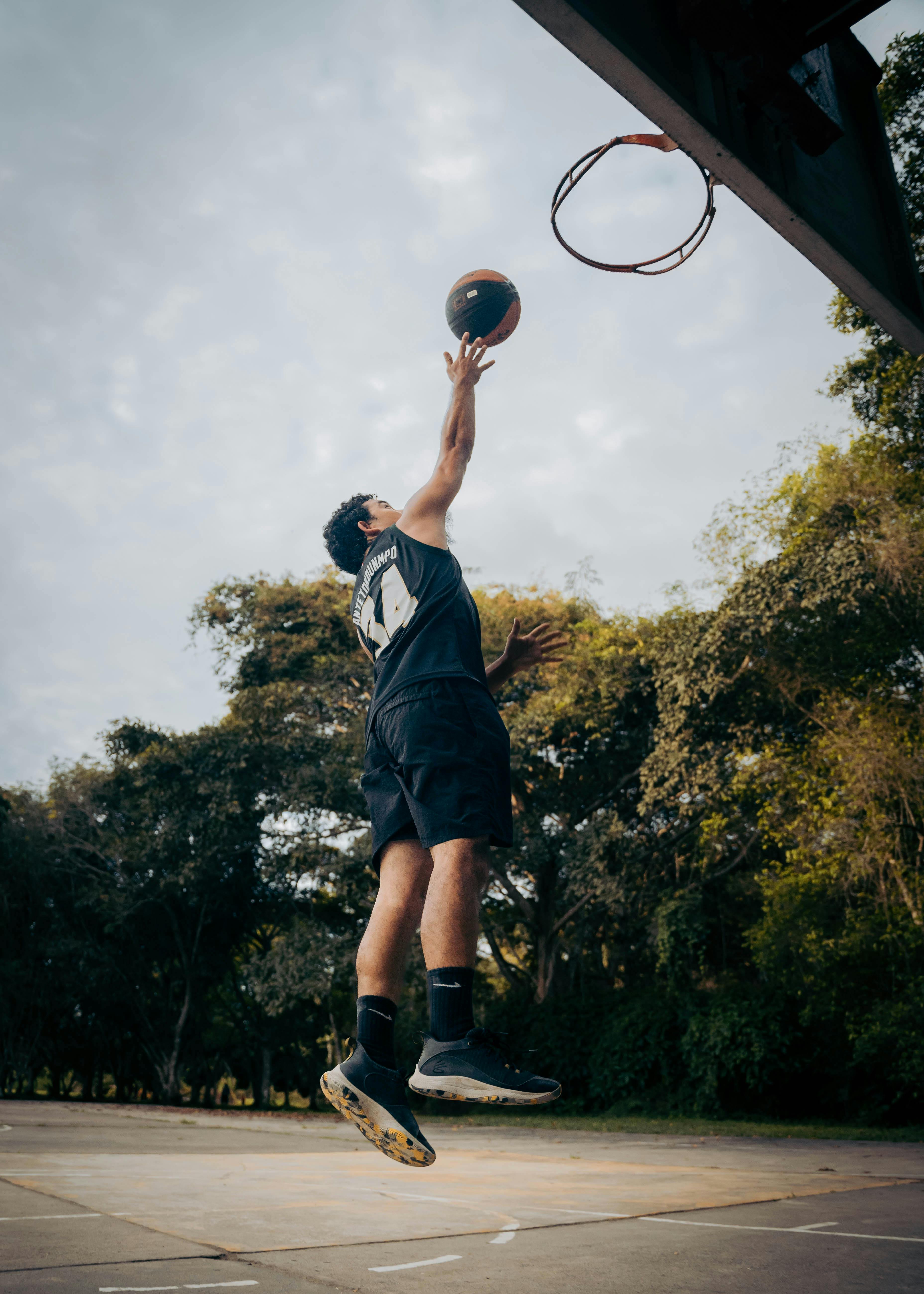 Photo Of Man Doing Dunk · Free Stock Photo