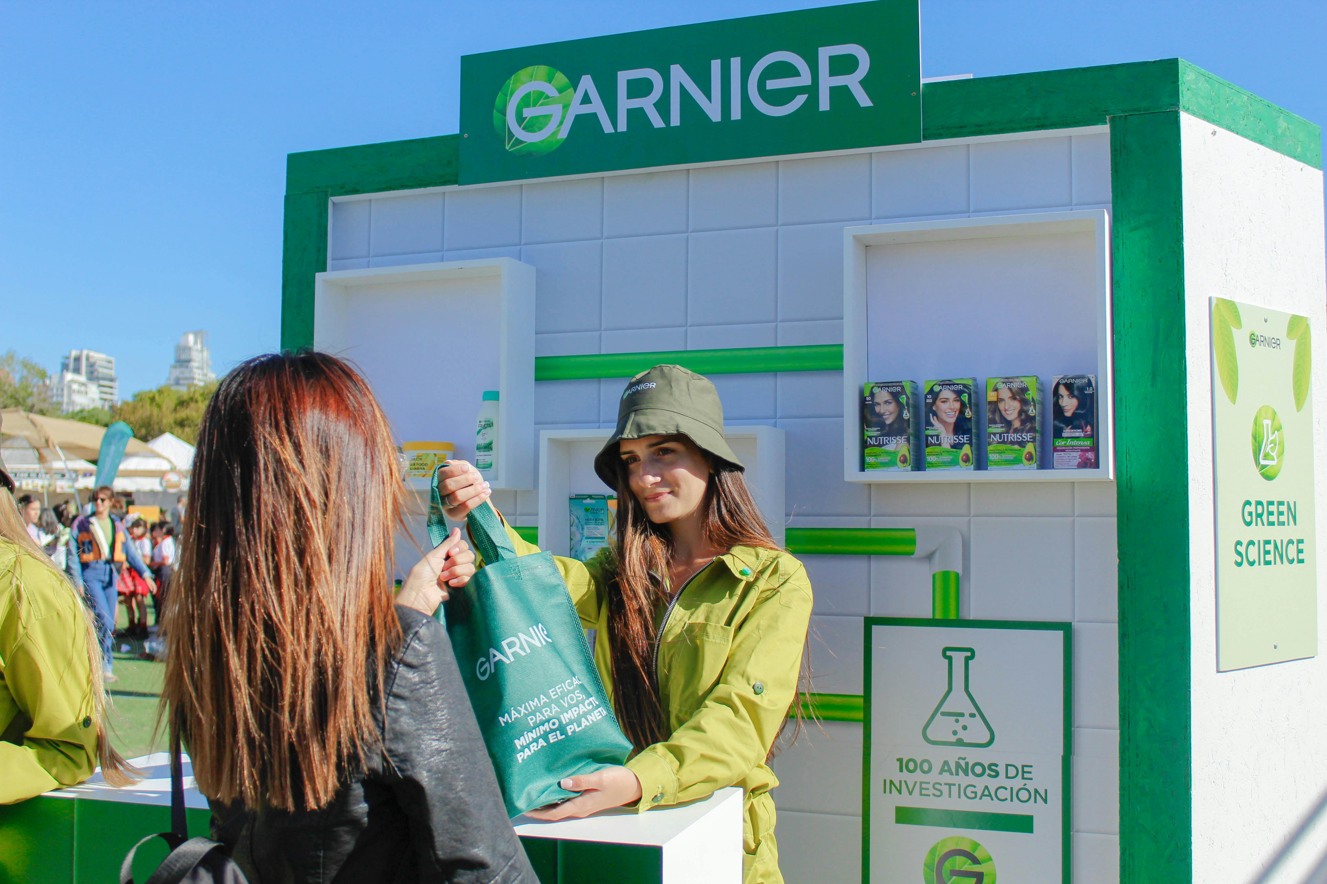 Garnier Brand Stand during a Showcase Event · Free Stock Photo