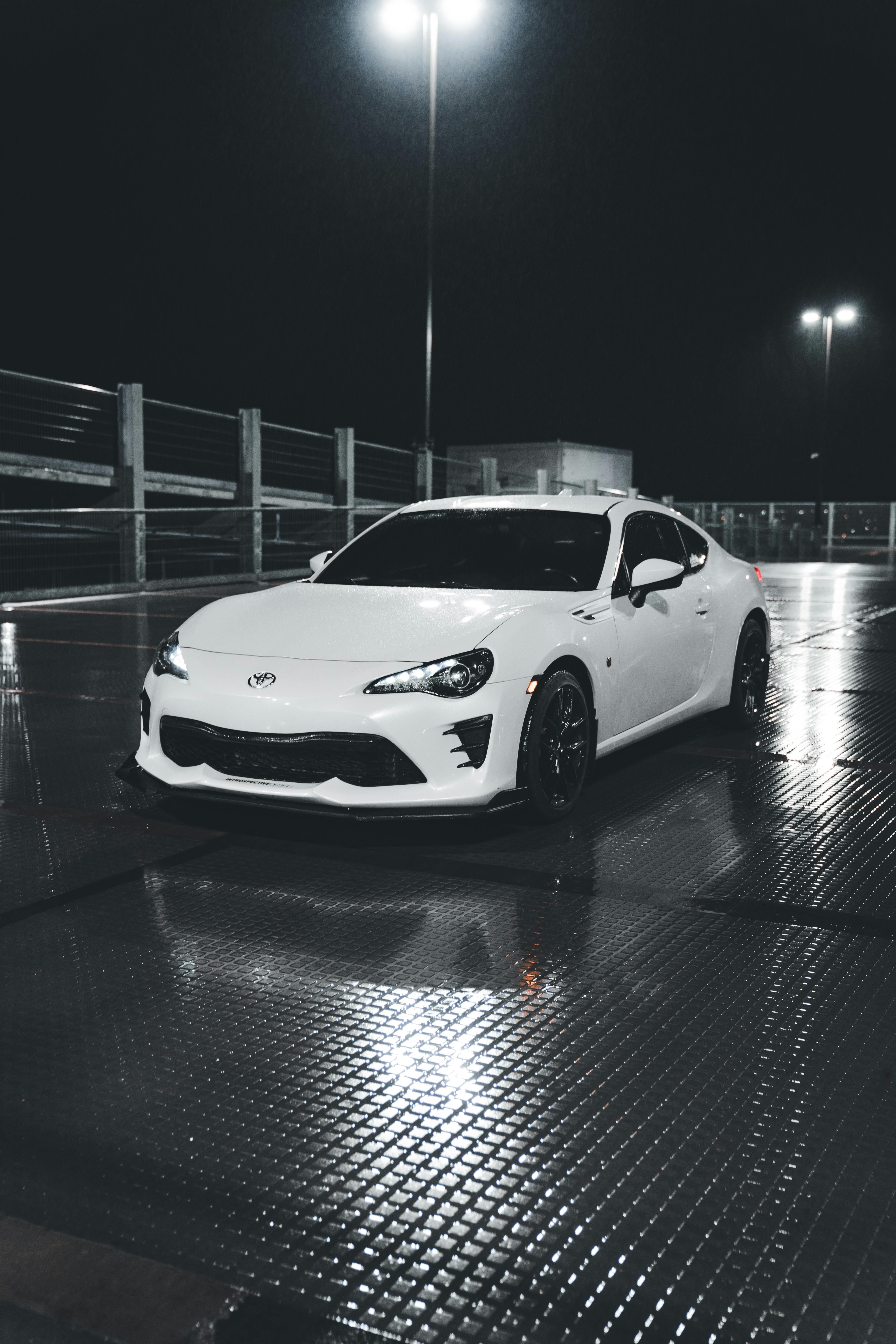 Rear View on White Toyota in Autumn · Free Stock Photo