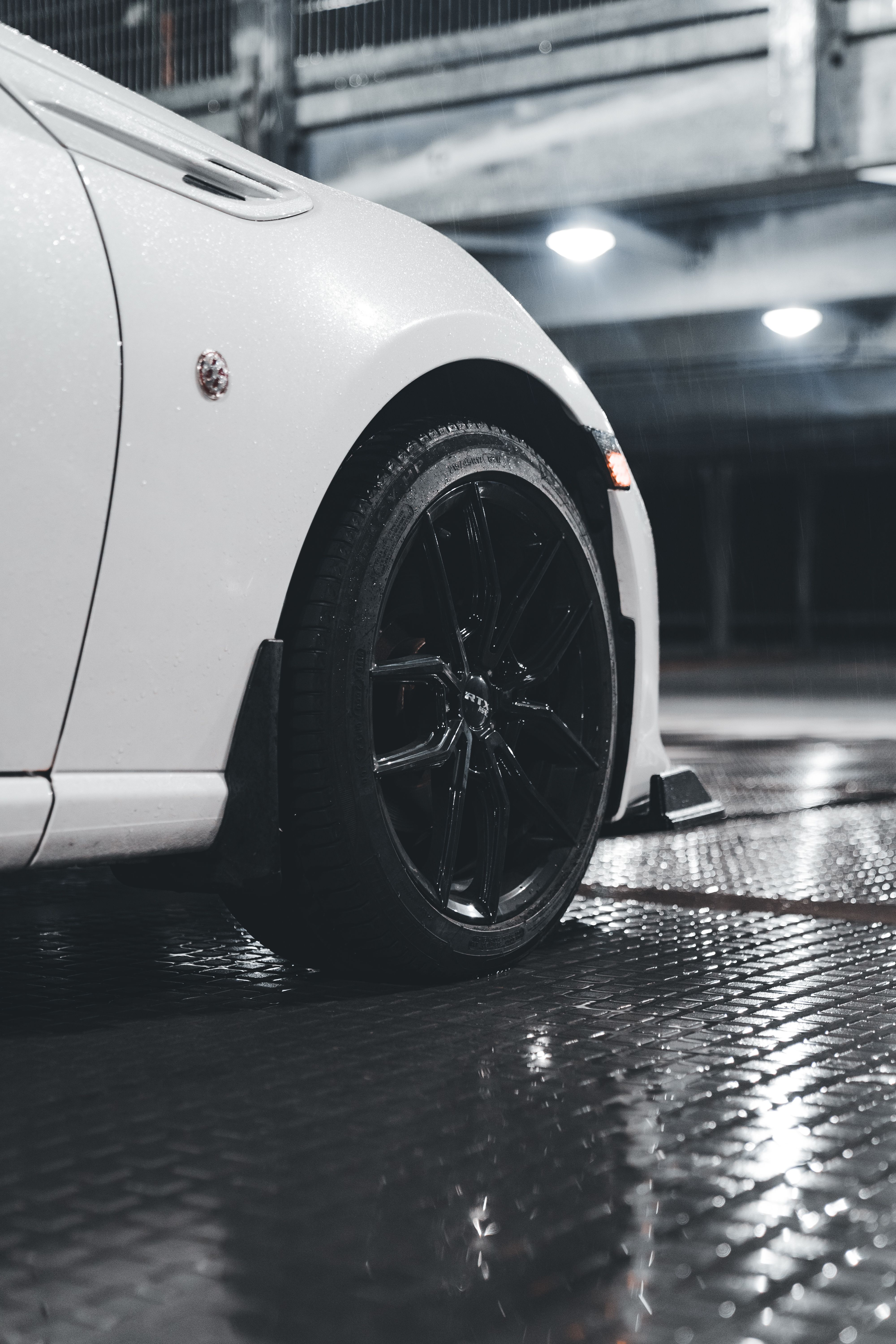 Shiny Silver Car Parked in a Garage · Free Stock Photo