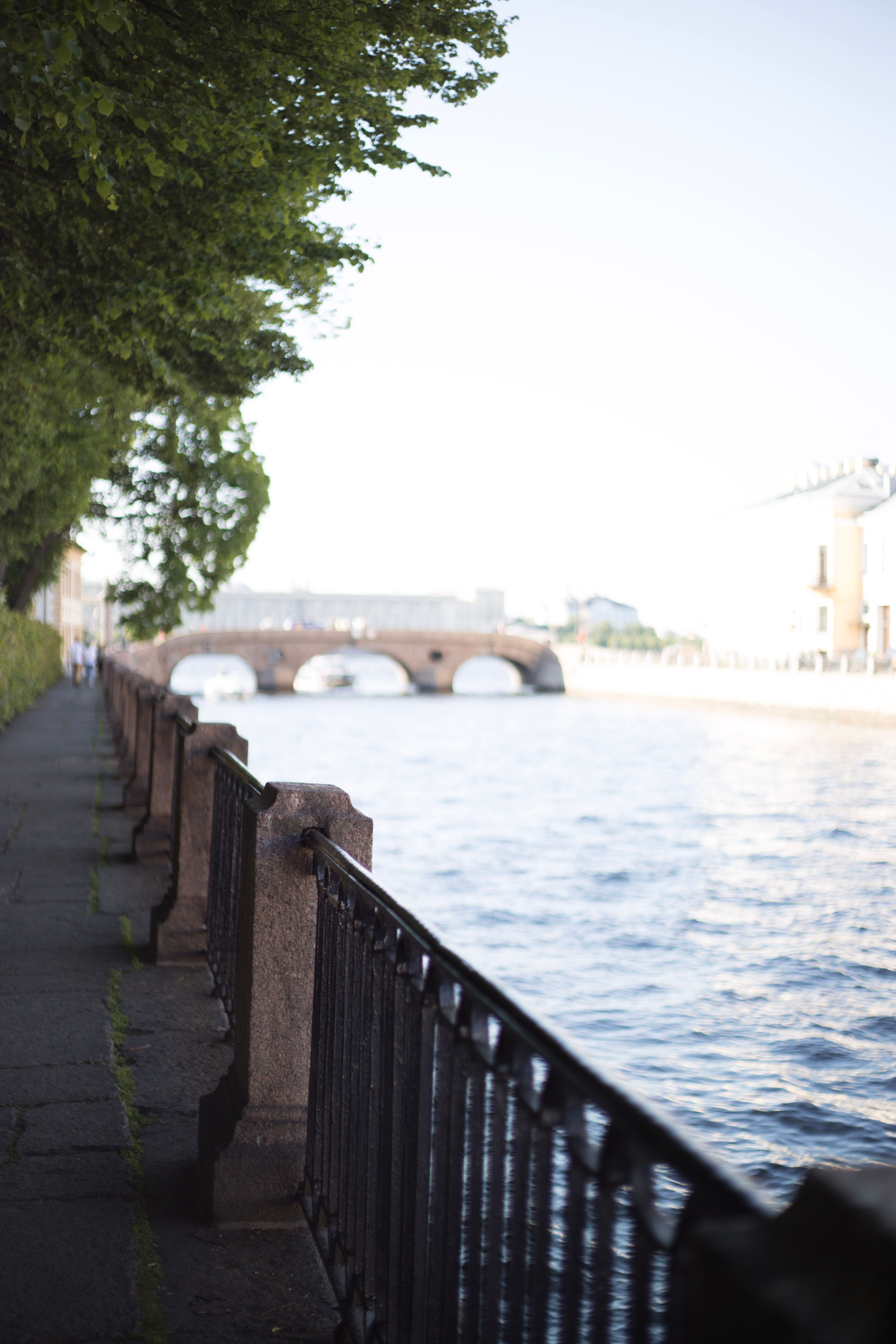 Blonde Woman on a Pavement by the River · Free Stock Photo