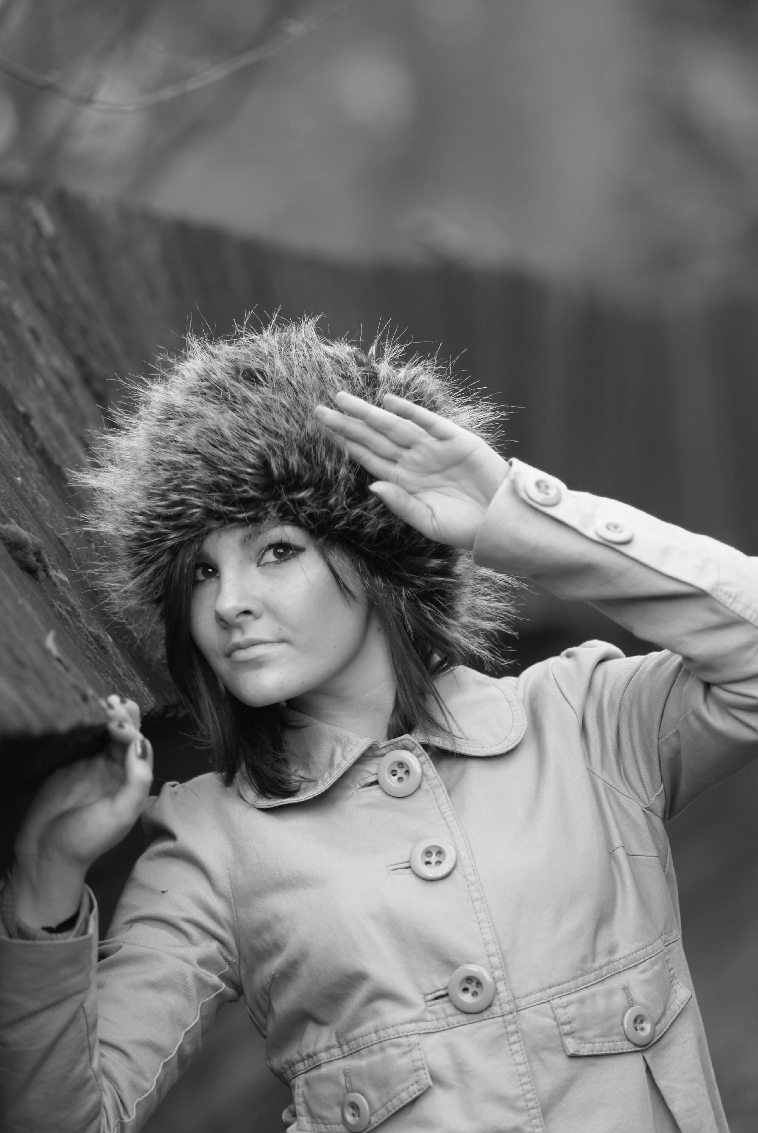 Monochrome Photo of Woman in Black Coat and Fedora Hat · Free Stock Photo