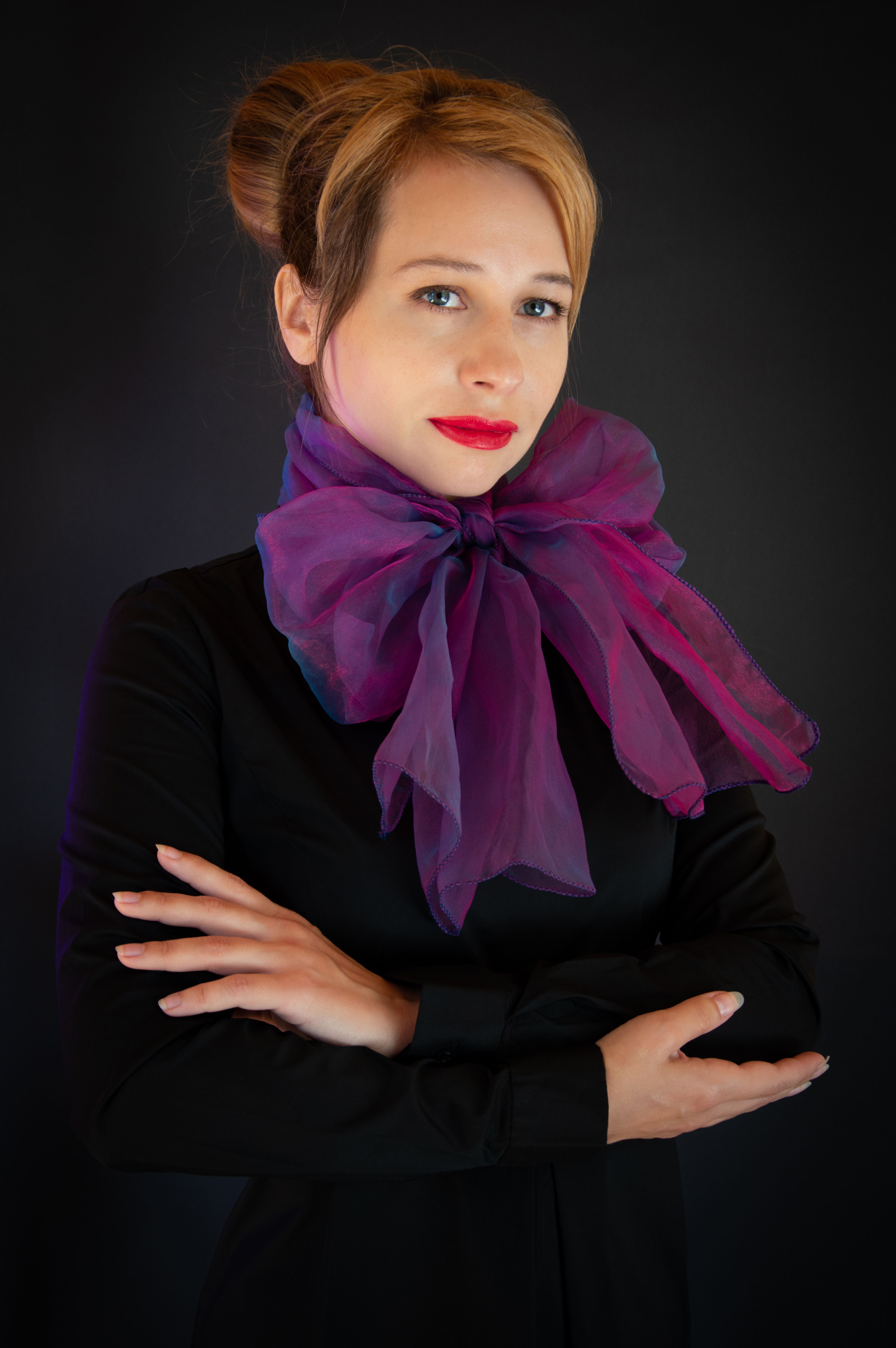 Portrait of a Woman Wearing Purple Scarf · Free Stock Photo