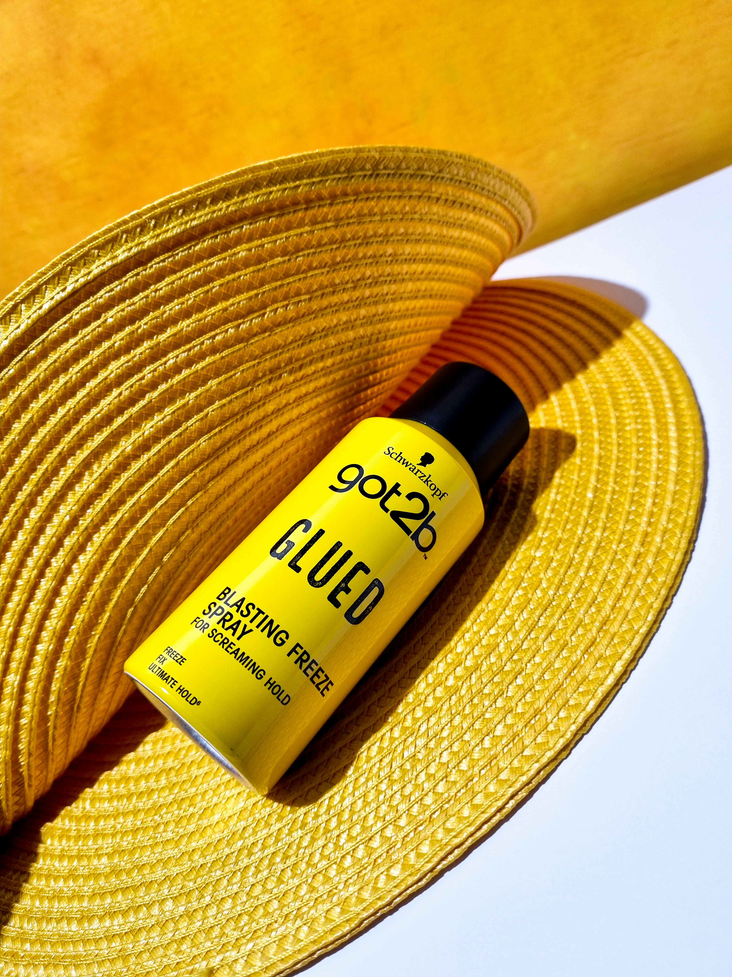 Close-up of a Bottle of Hairspray in Sunlight · Free Stock Photo