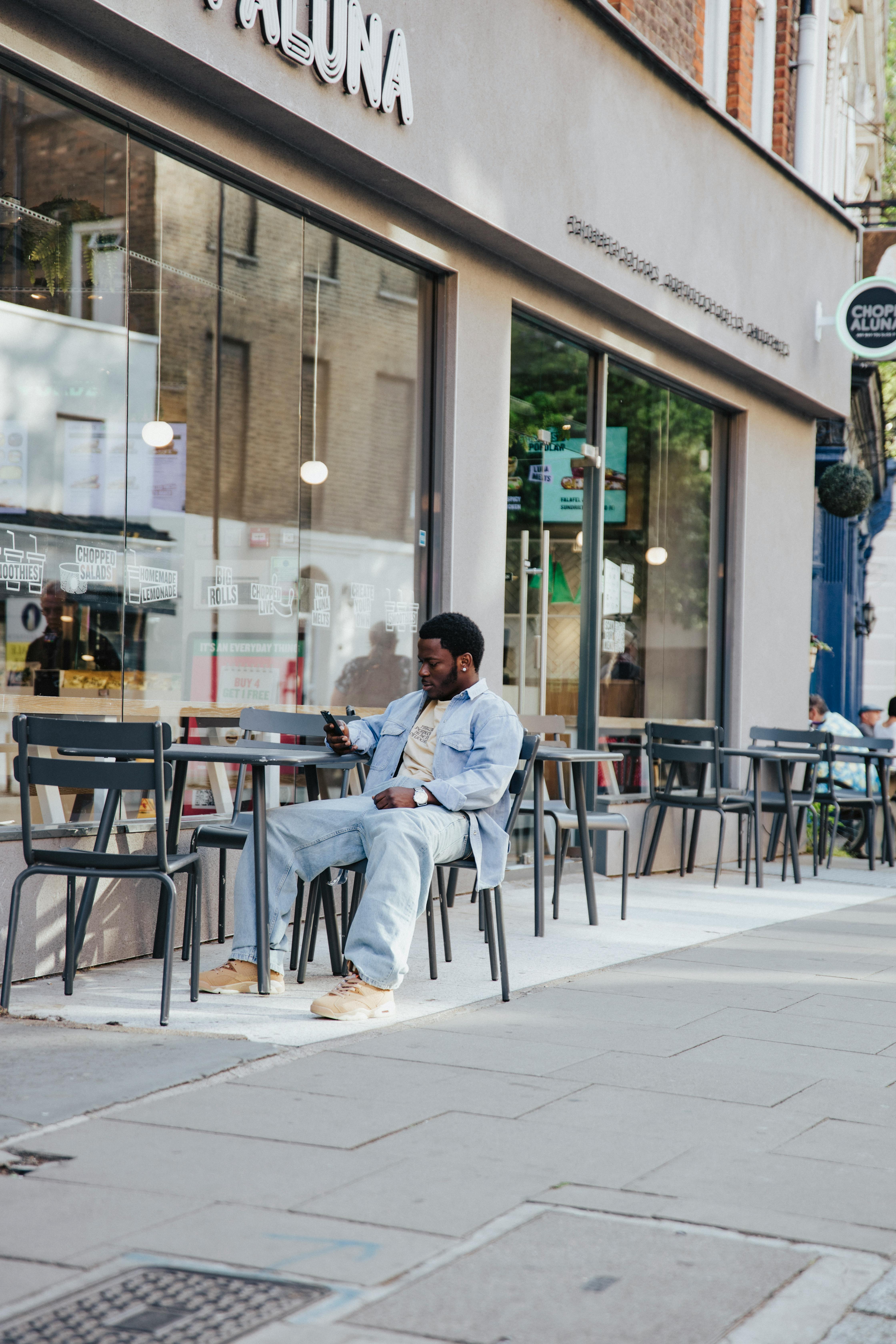 Sidewalk Cafe in a City Street · Free Stock Photo