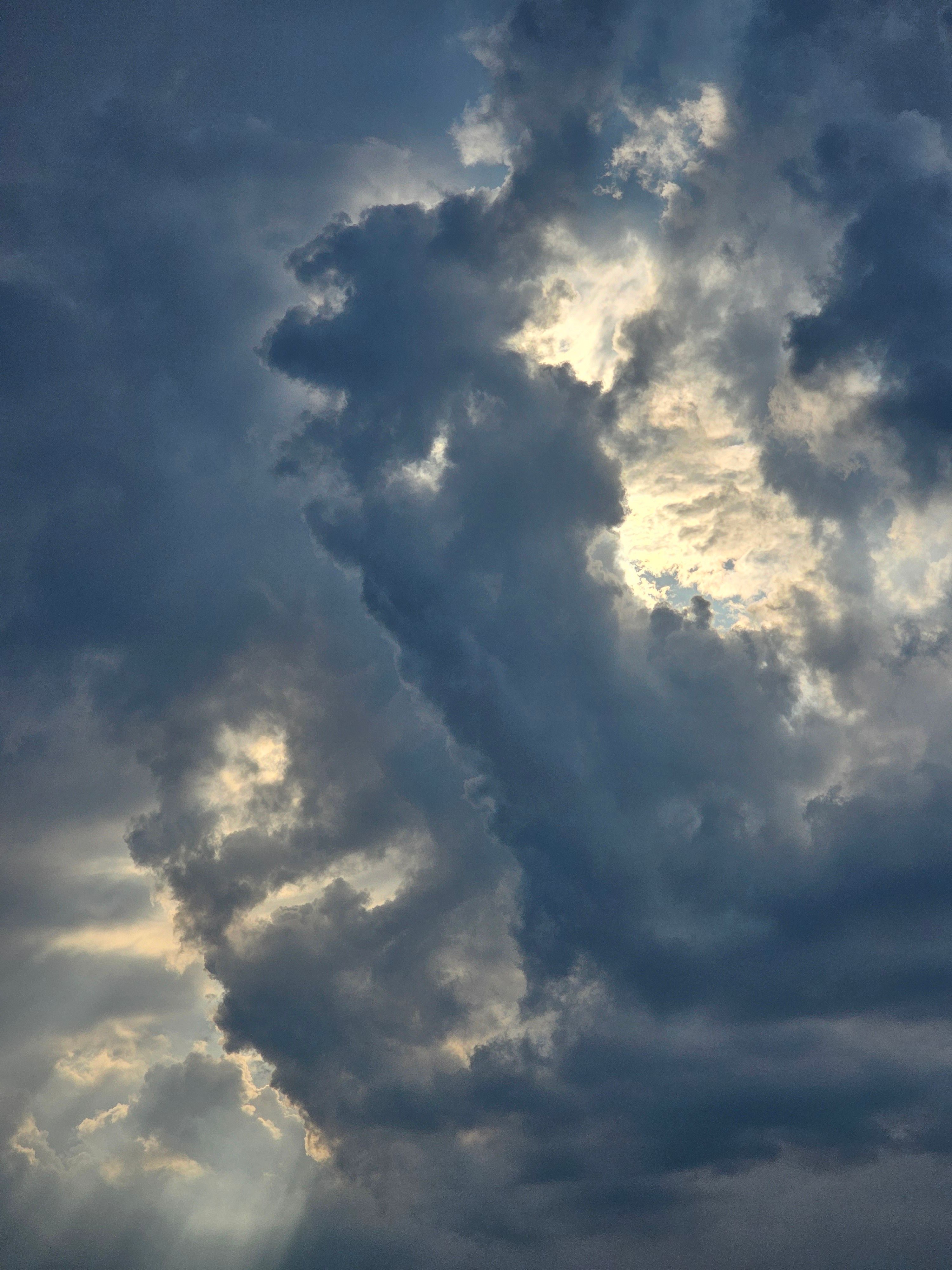 Sunlight between Rain Clouds · Free Stock Photo