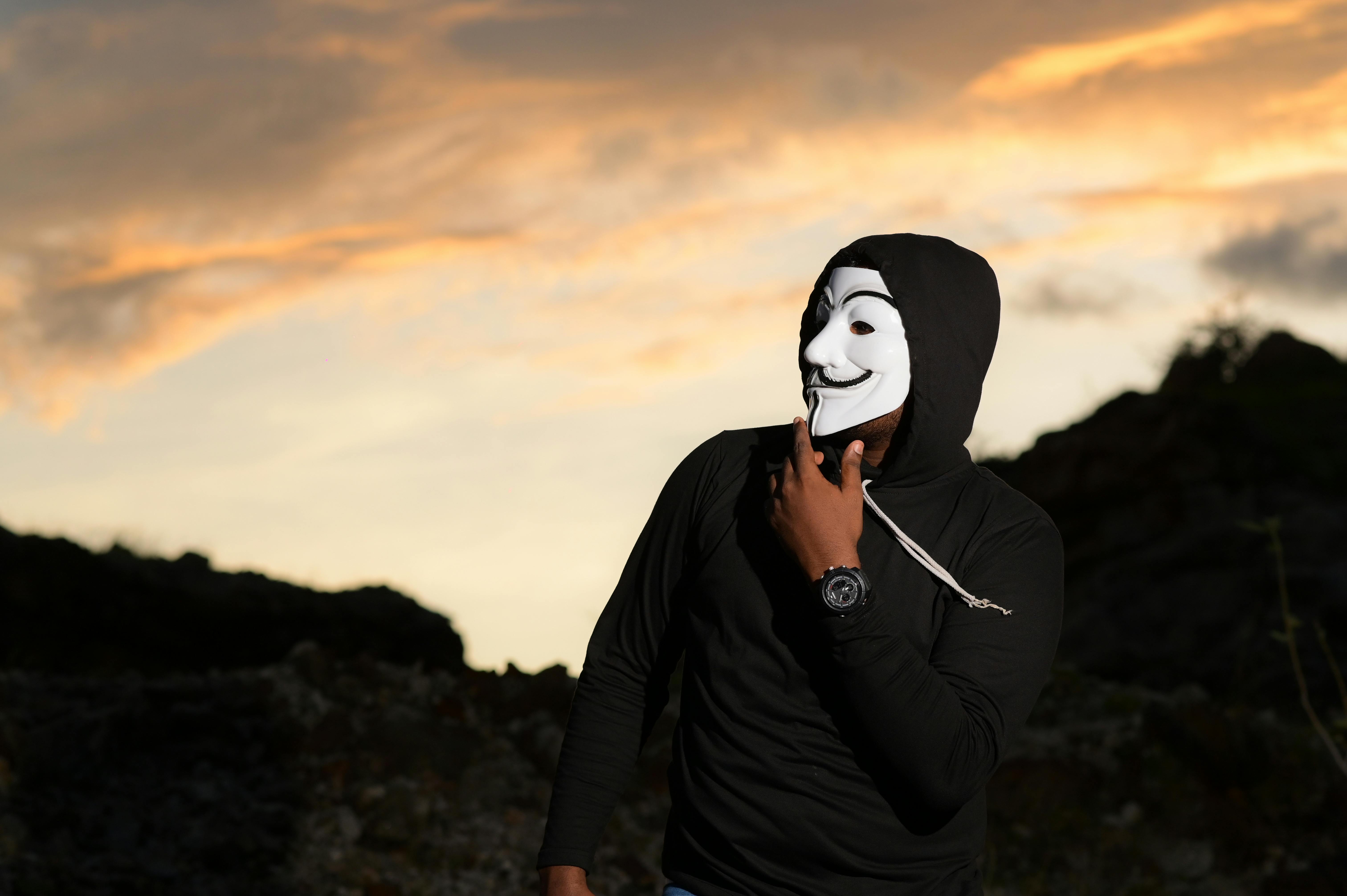 Man Standing in Guy Fawkes Mask · Free Stock Photo