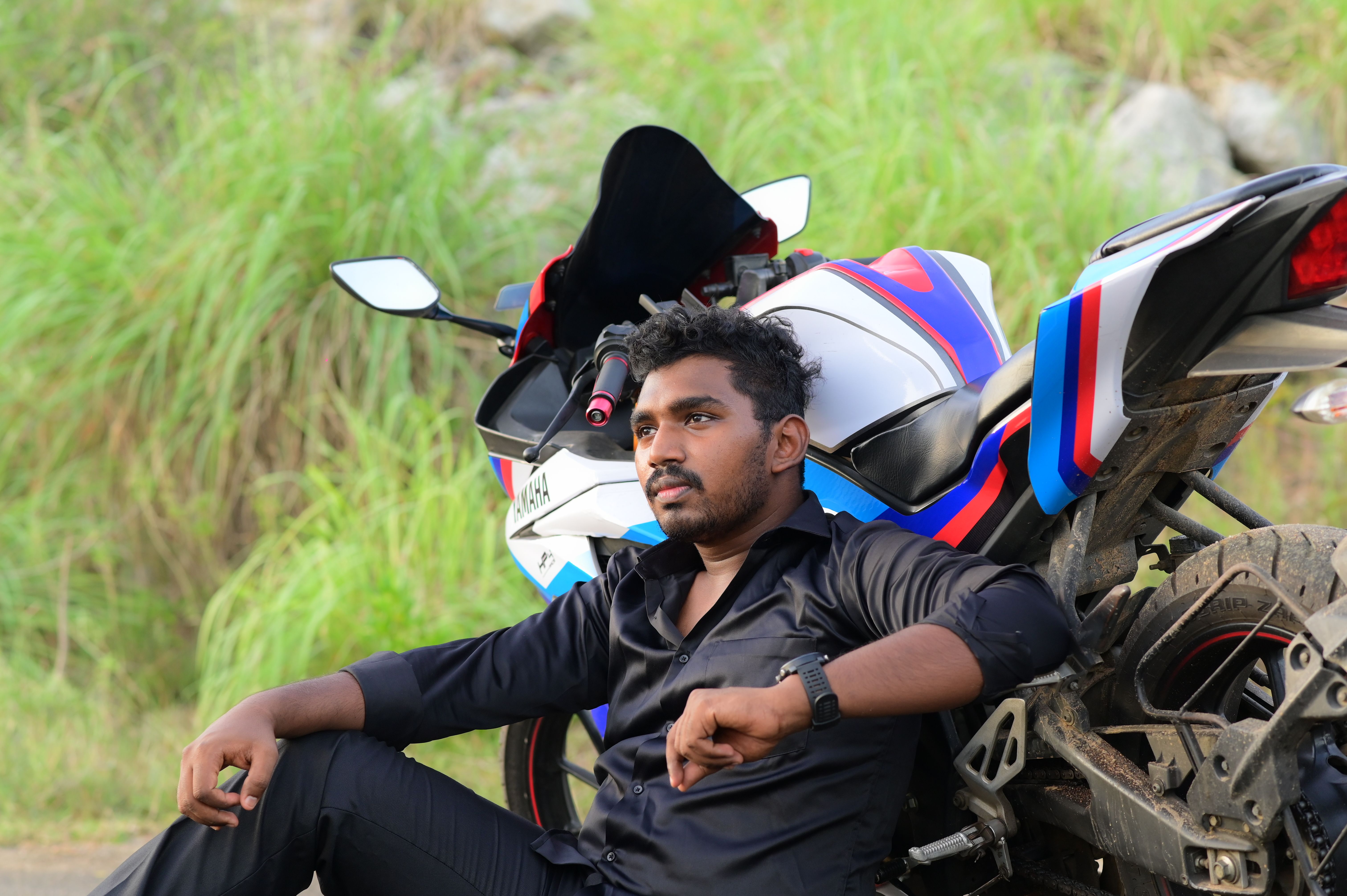Pensive Man Sitting on the Road Leaning on a Yamaha Motorcycle · Free ...