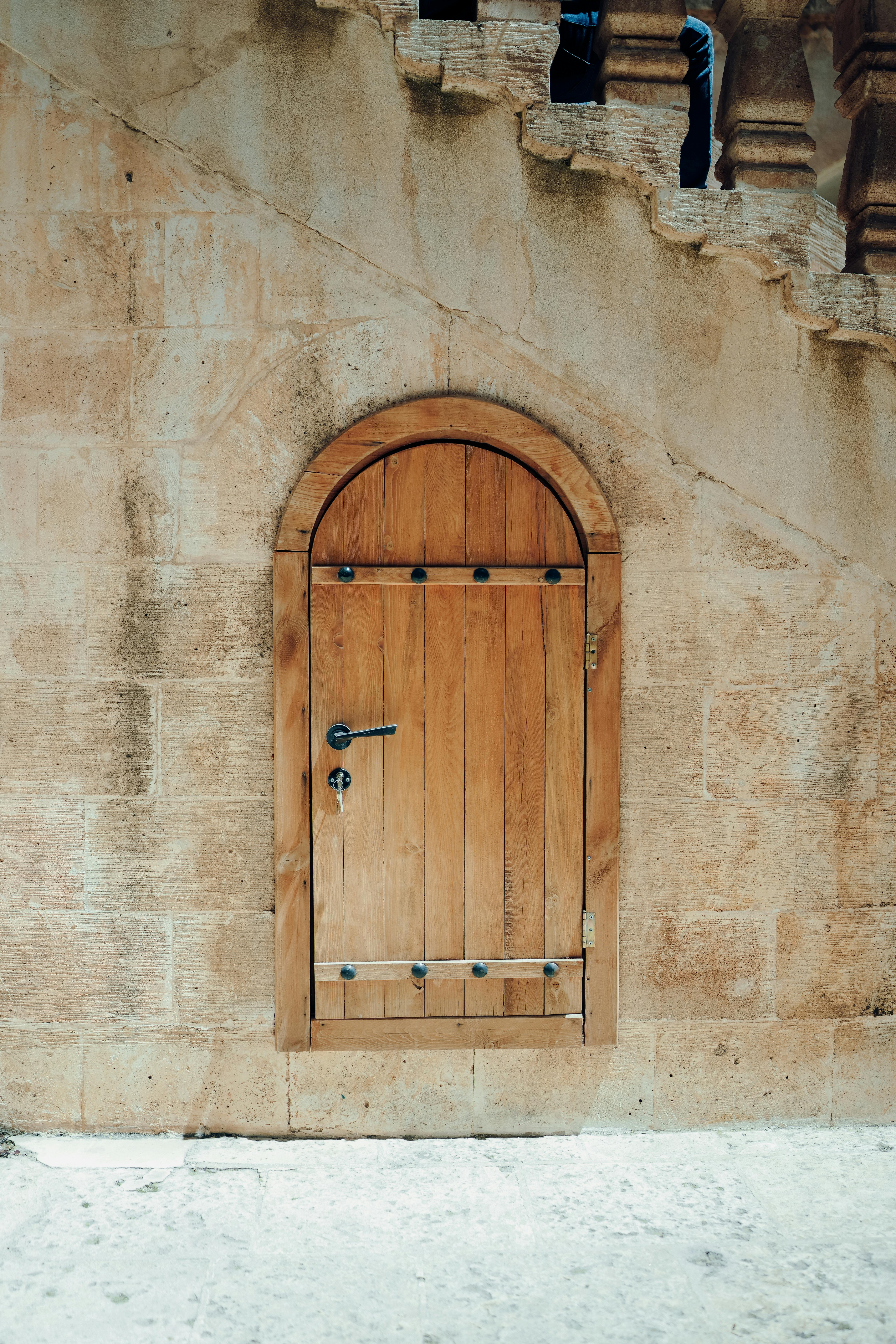 Wooden Door under Steps · Free Stock Photo