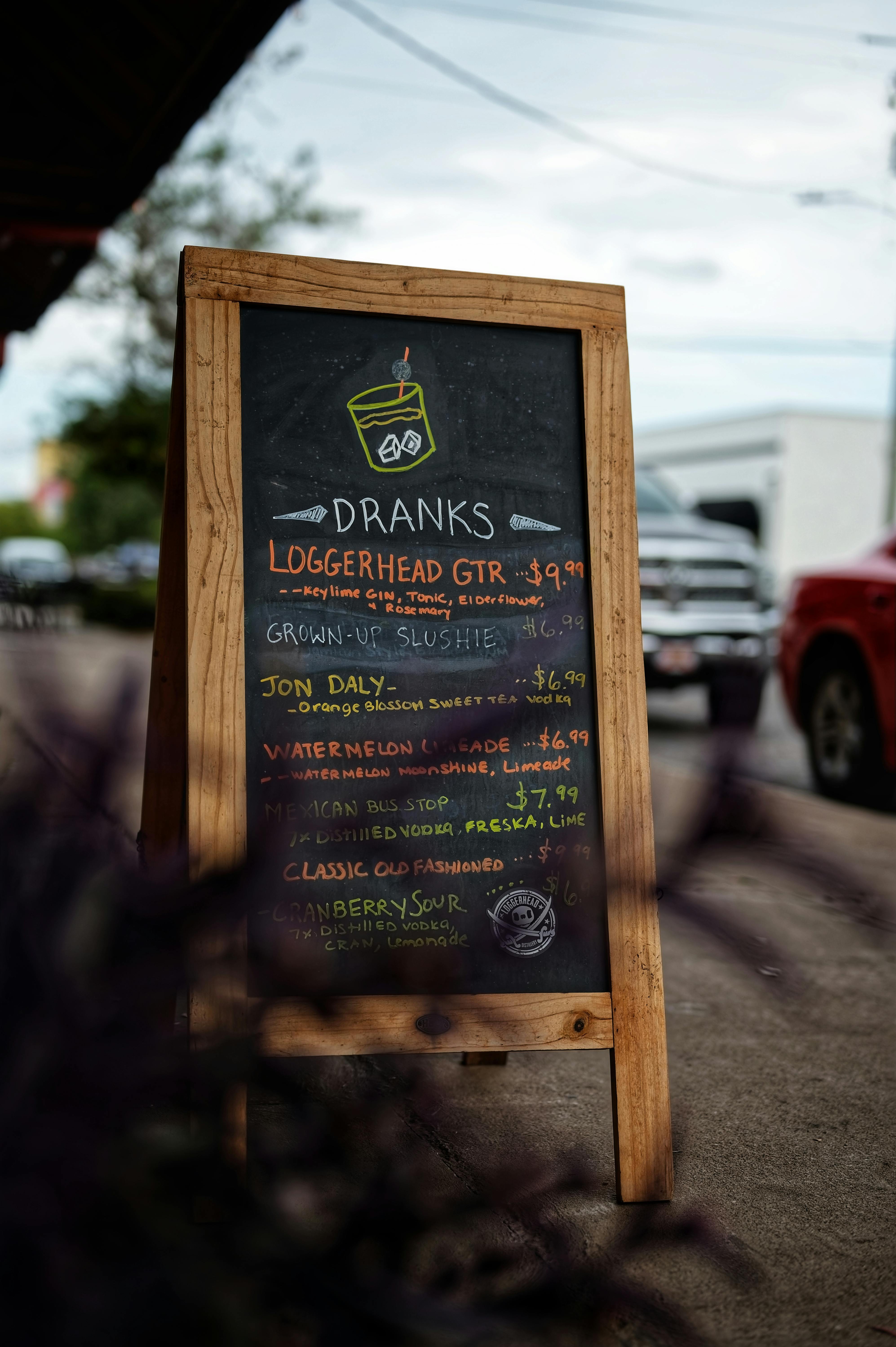 A Menu Board in front of a Restaurant · Free Stock Photo