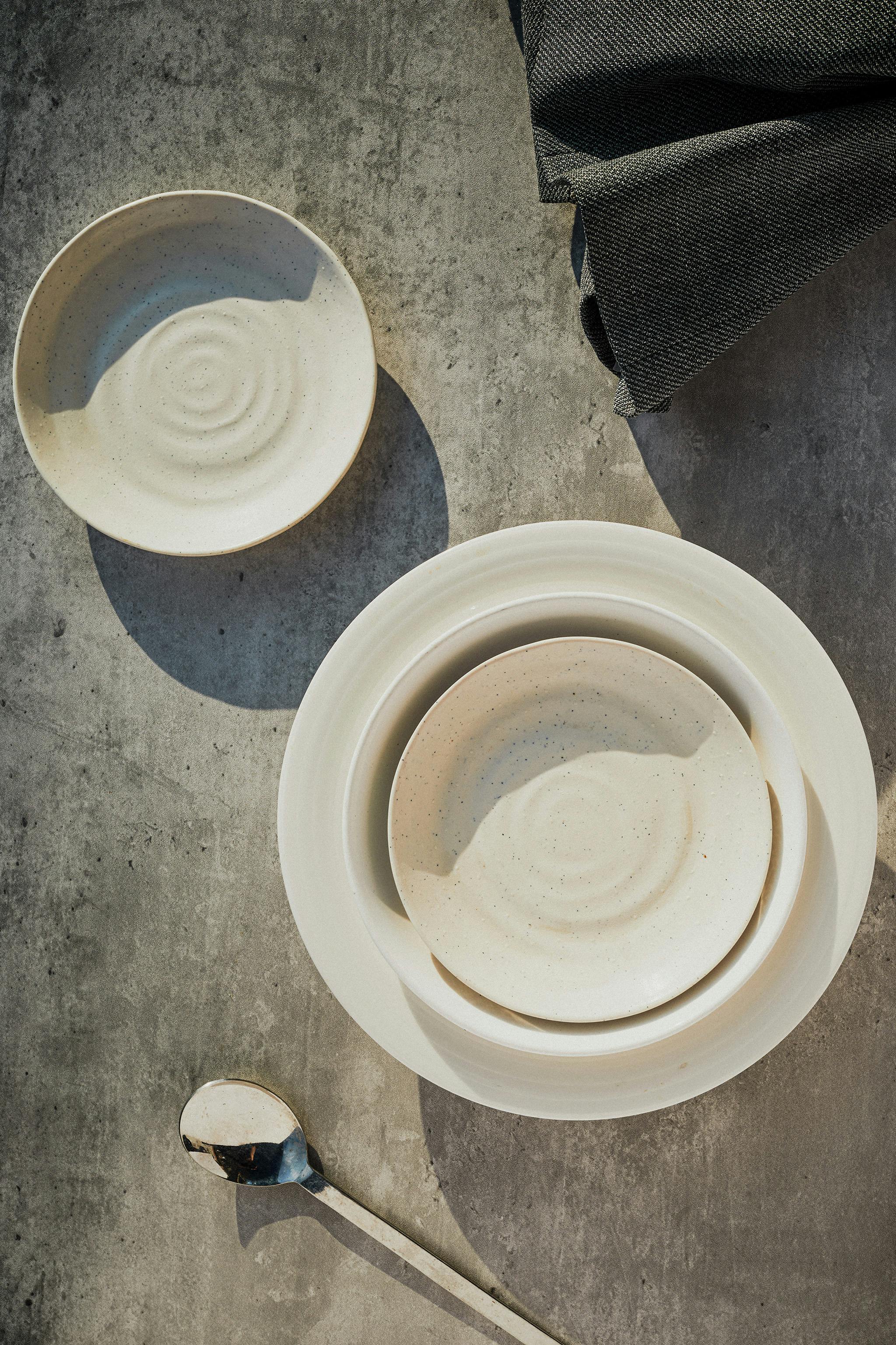 Empty Dishes on Gray Surface · Free Stock Photo