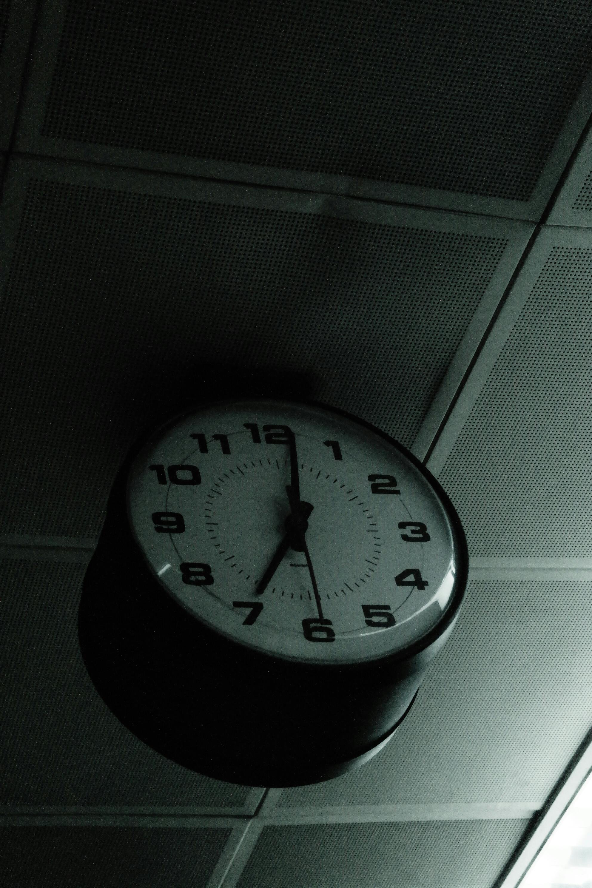 Analogue Clock Hanging from Ceiling · Free Stock Photo