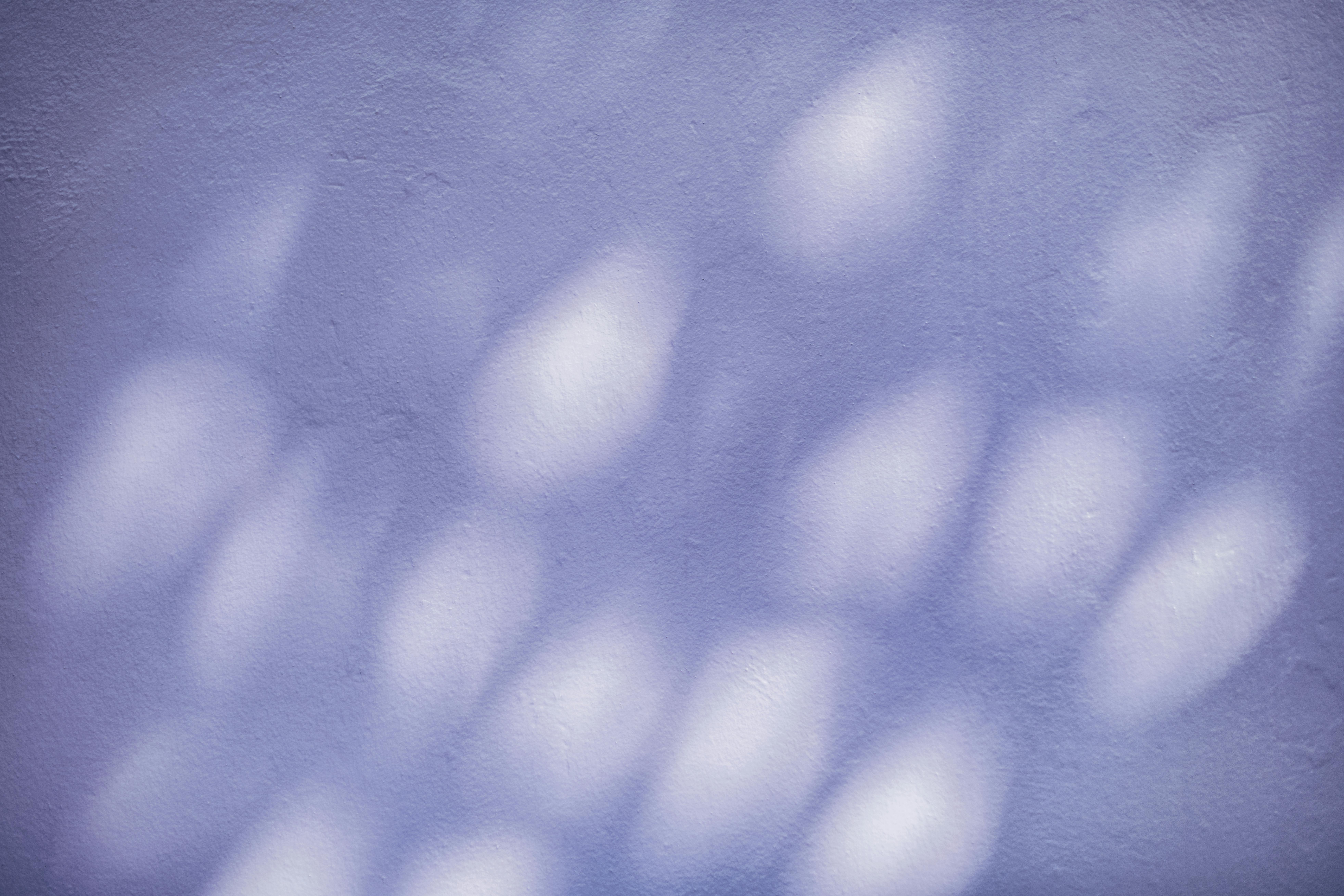 Specks of Light on Blue Wall · Free Stock Photo