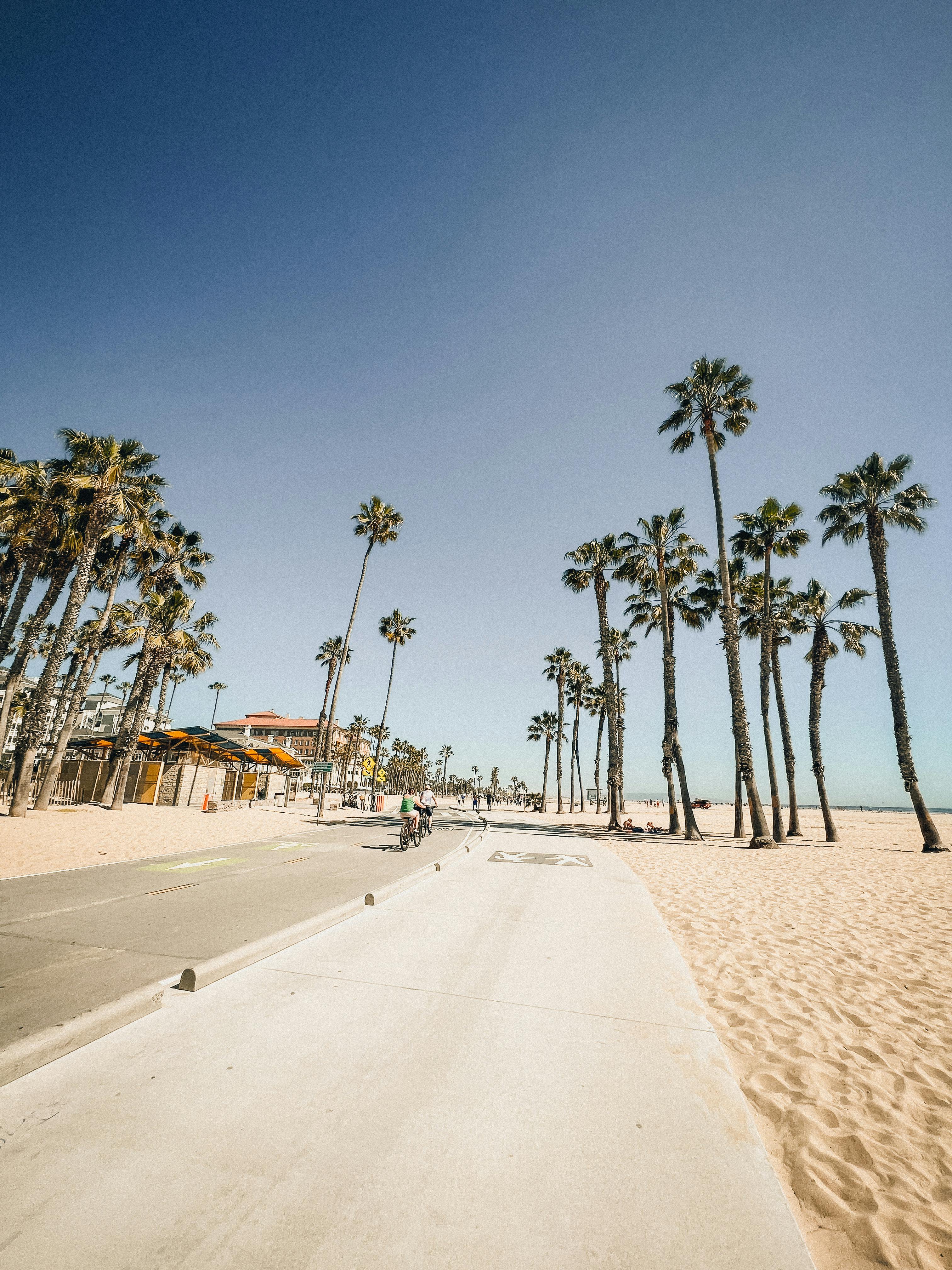 Sidewalk Along Beach in Resort · Free Stock Photo