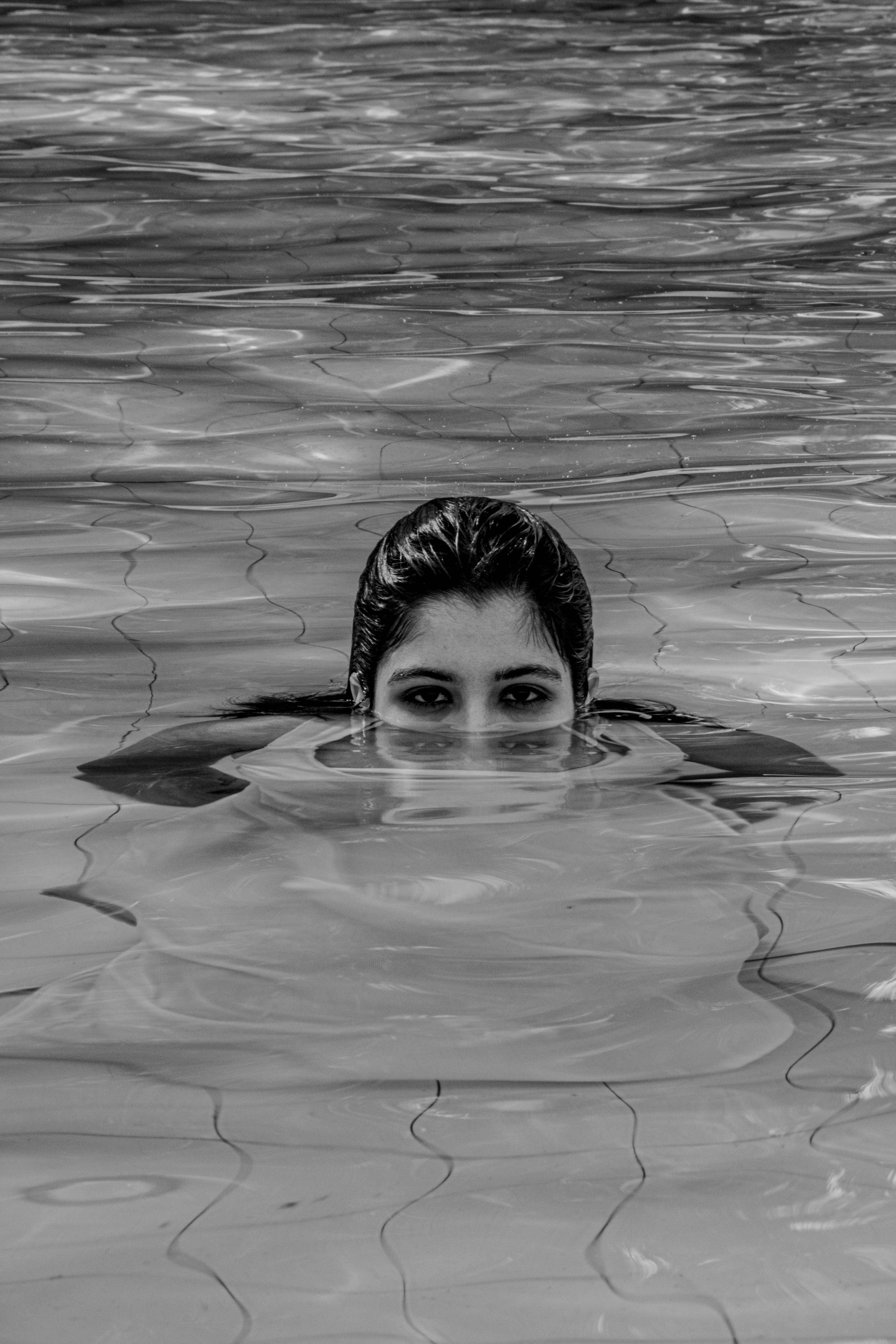 Photo of a Woman Emerging from the Water in a Swimming Pool · Free ...