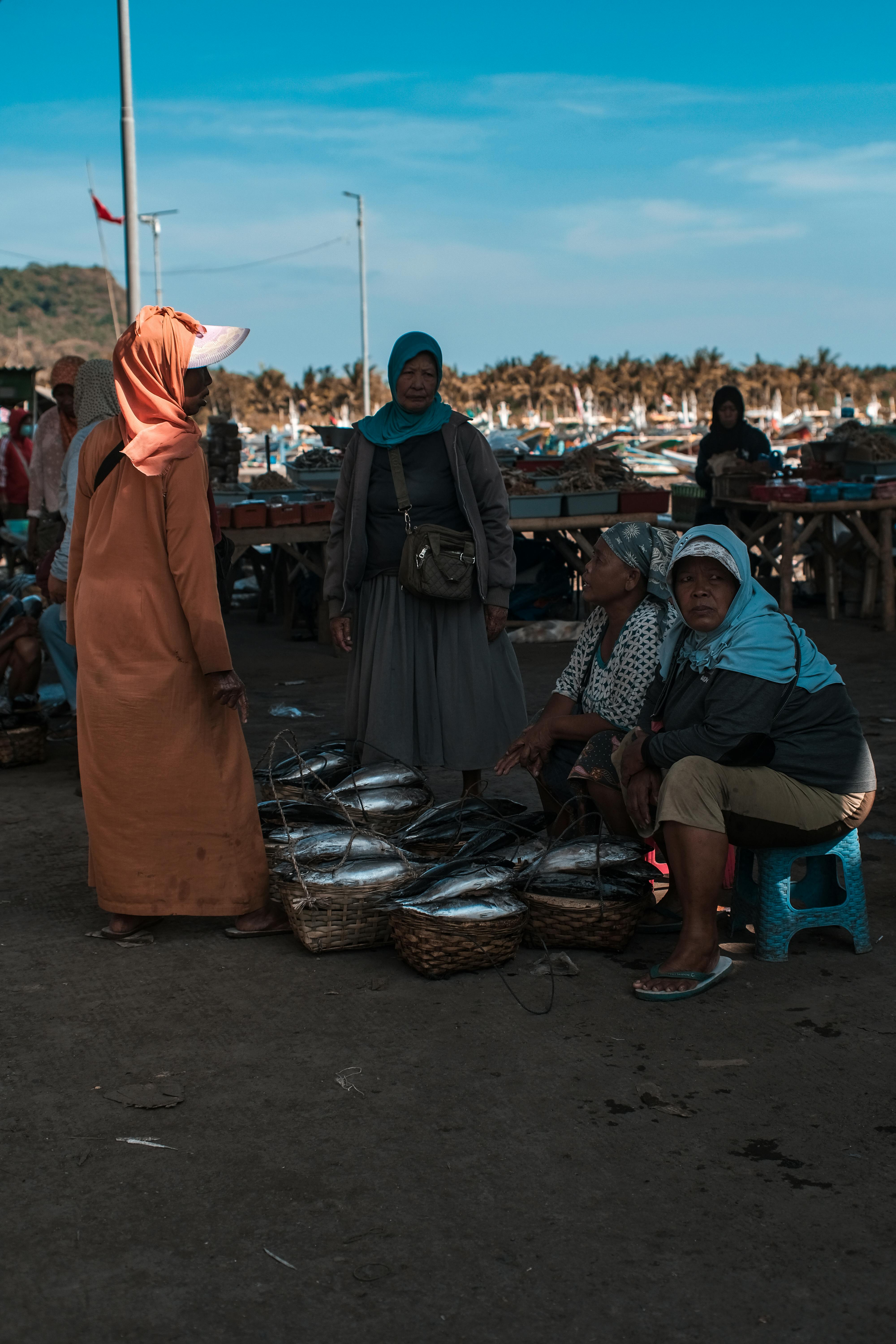 People Selling Fish on a Market · Free Stock Photo
