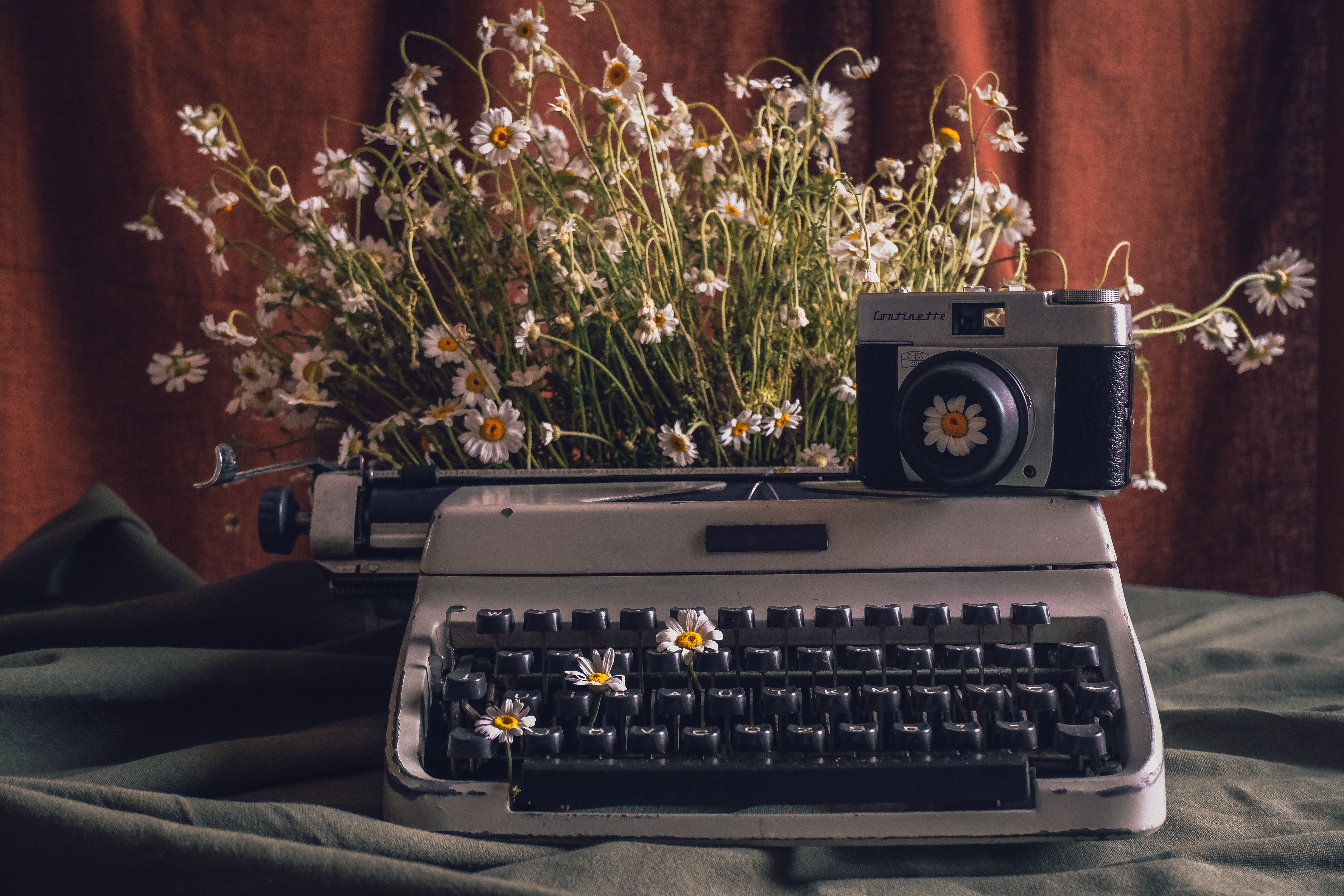 A Typewriter and Flowers · Free Stock Photo