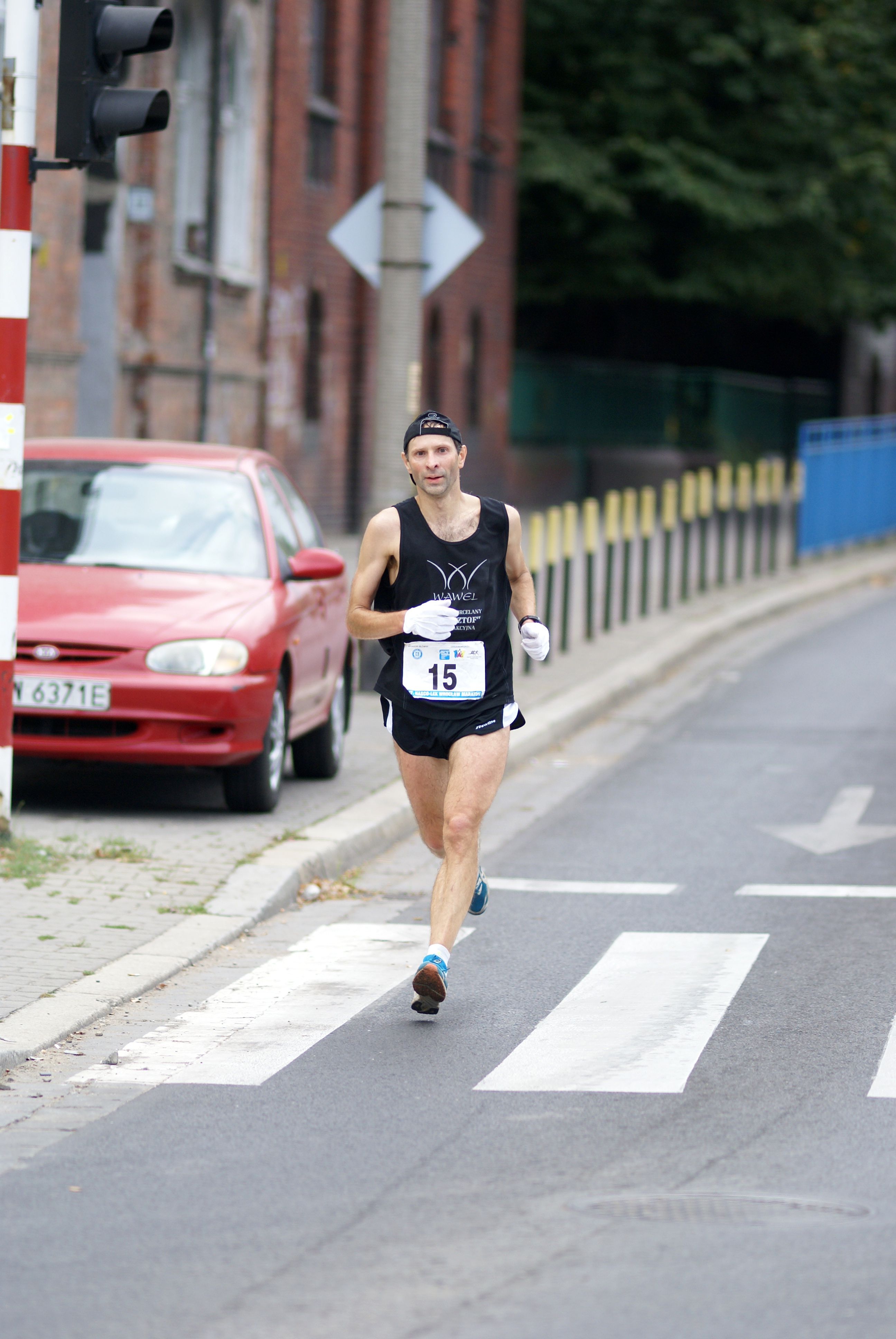 Man Running on a Street · Free Stock Photo