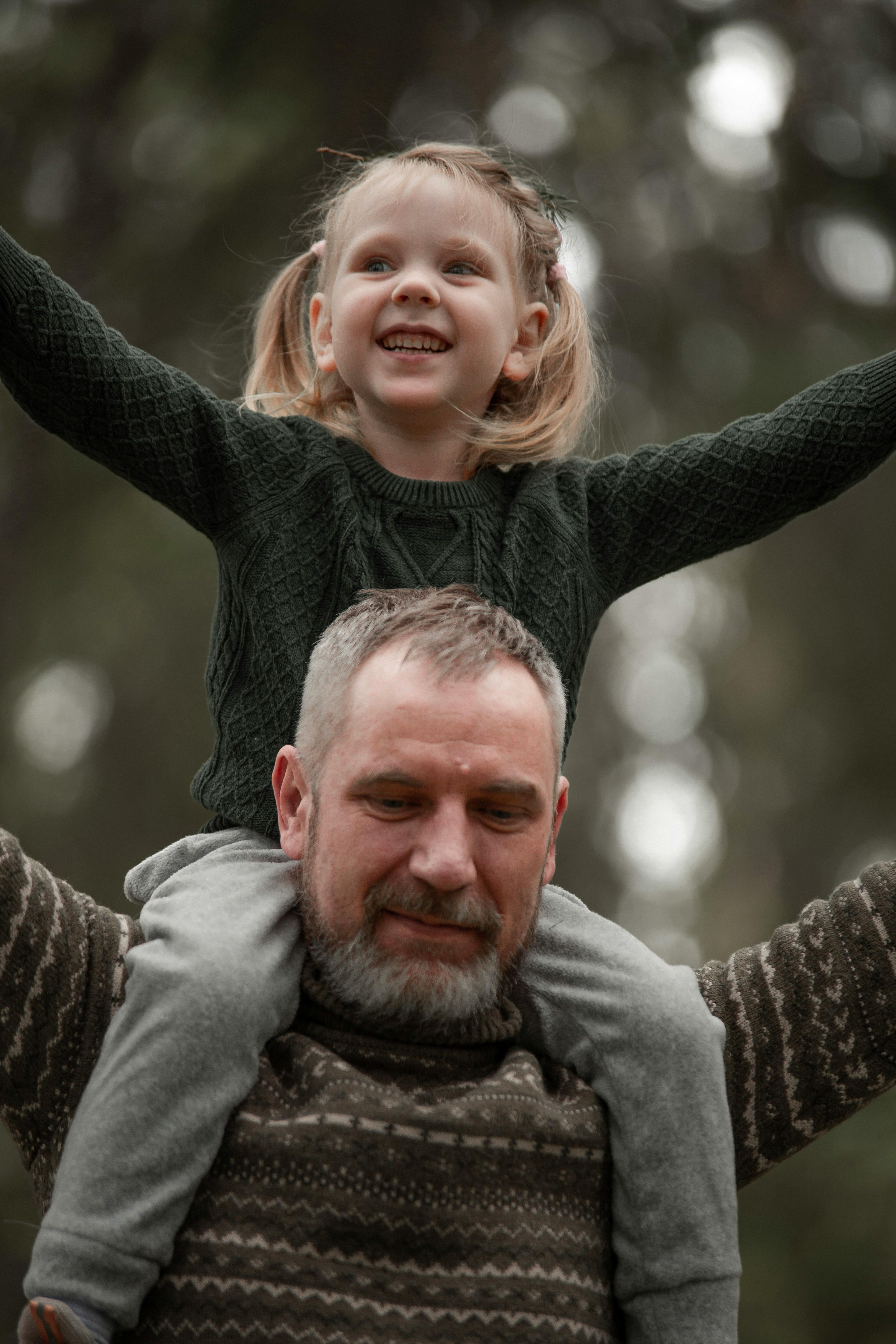 Man Carrying Girl · Free Stock Photo