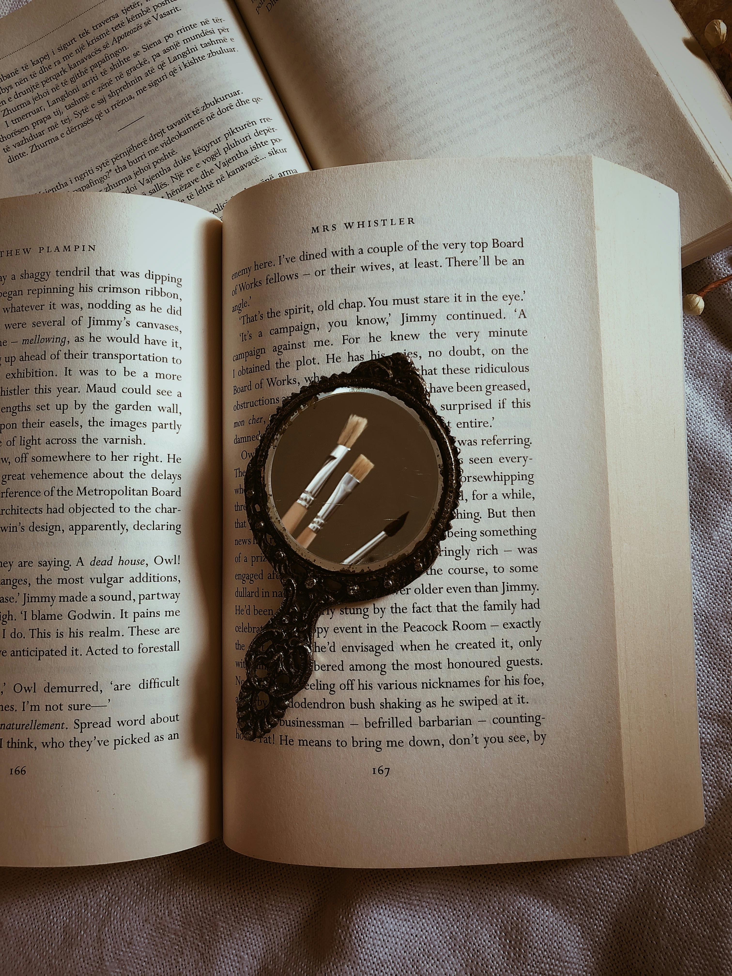 A Mirror on a Book · Free Stock Photo
