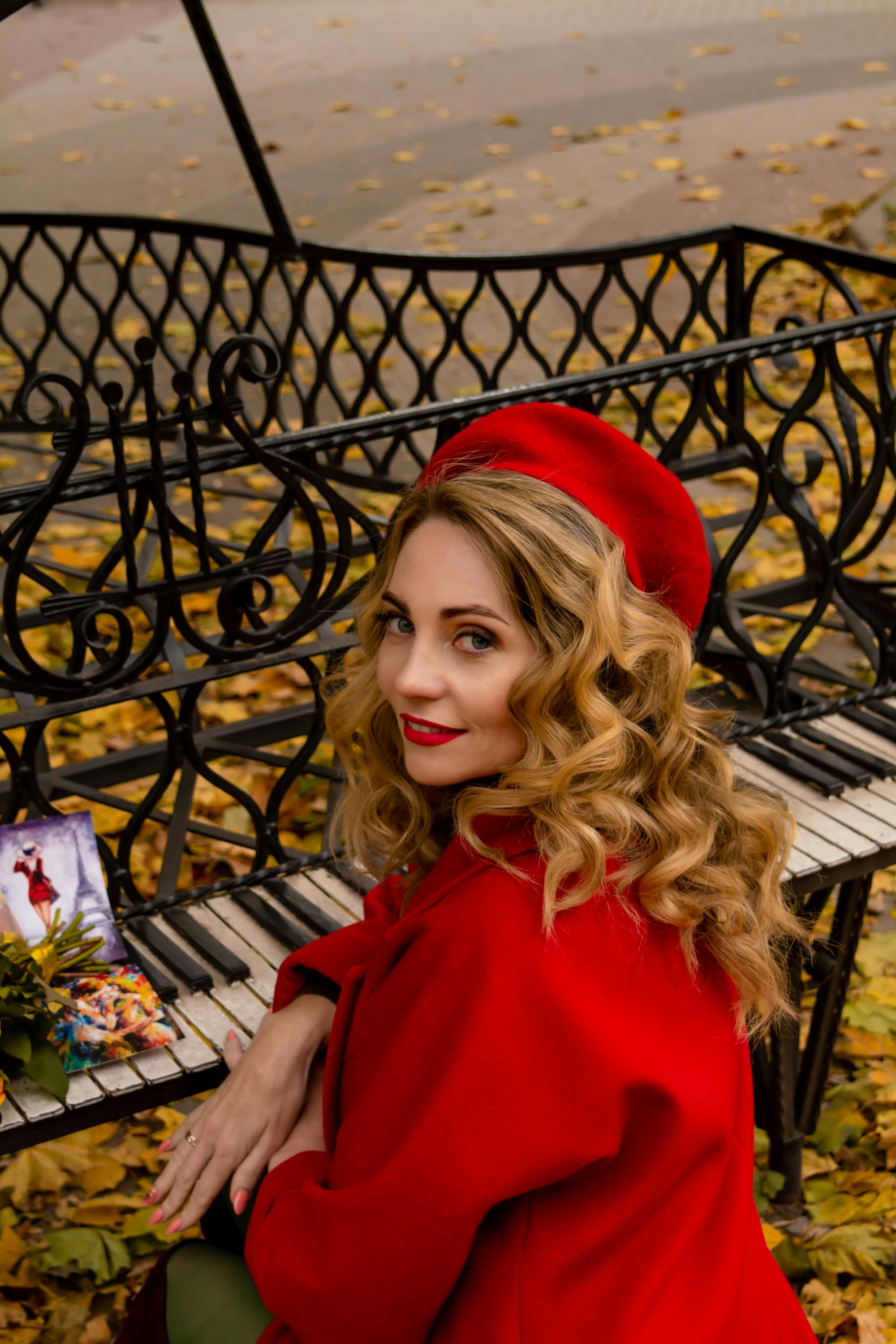 A Woman Crouching by a Bench · Free Stock Photo