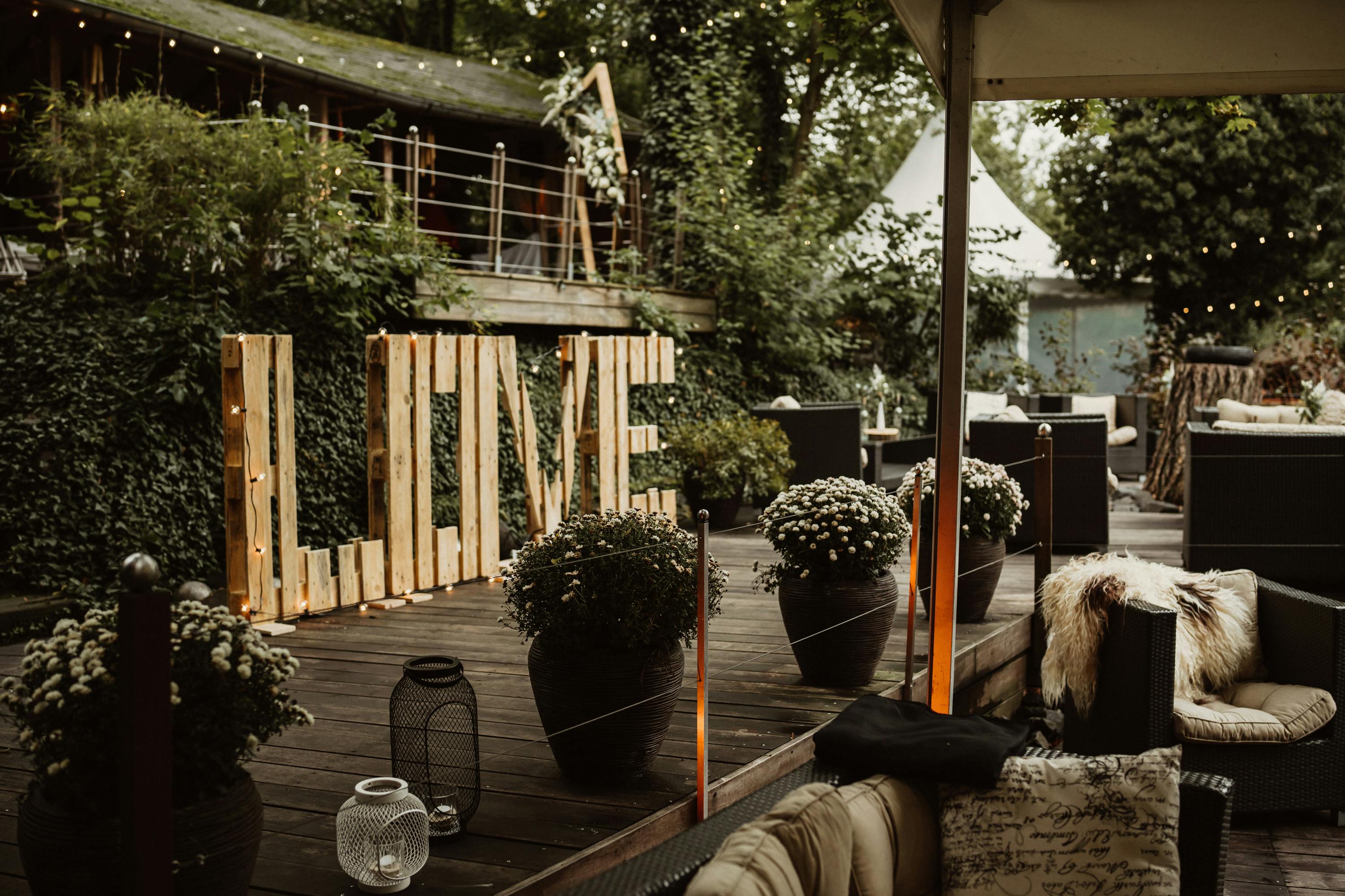 Love Text on Decorated, Wooden Stage · Free Stock Photo