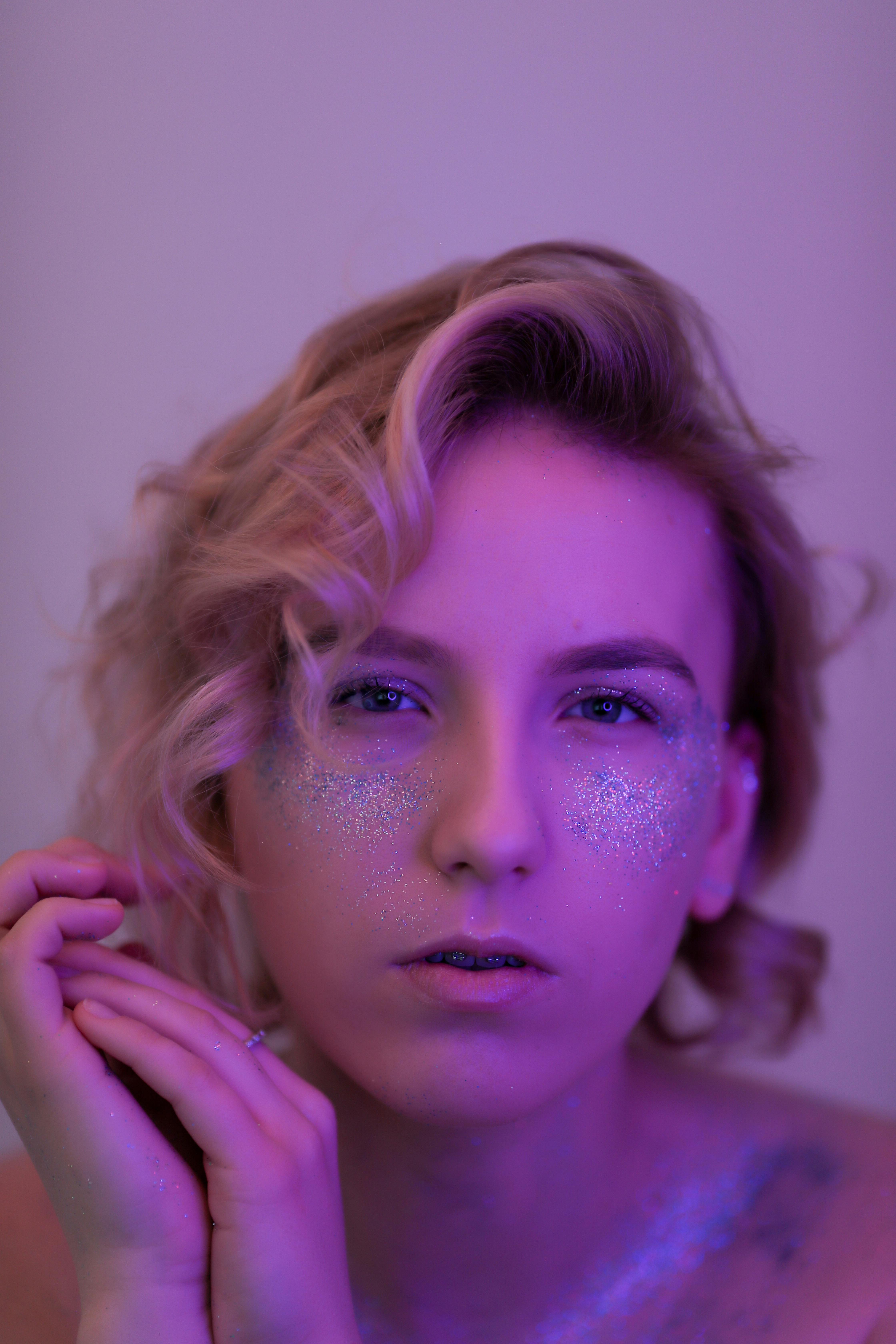 Portrait of Young Woman with Glitter on Face · Free Stock Photo