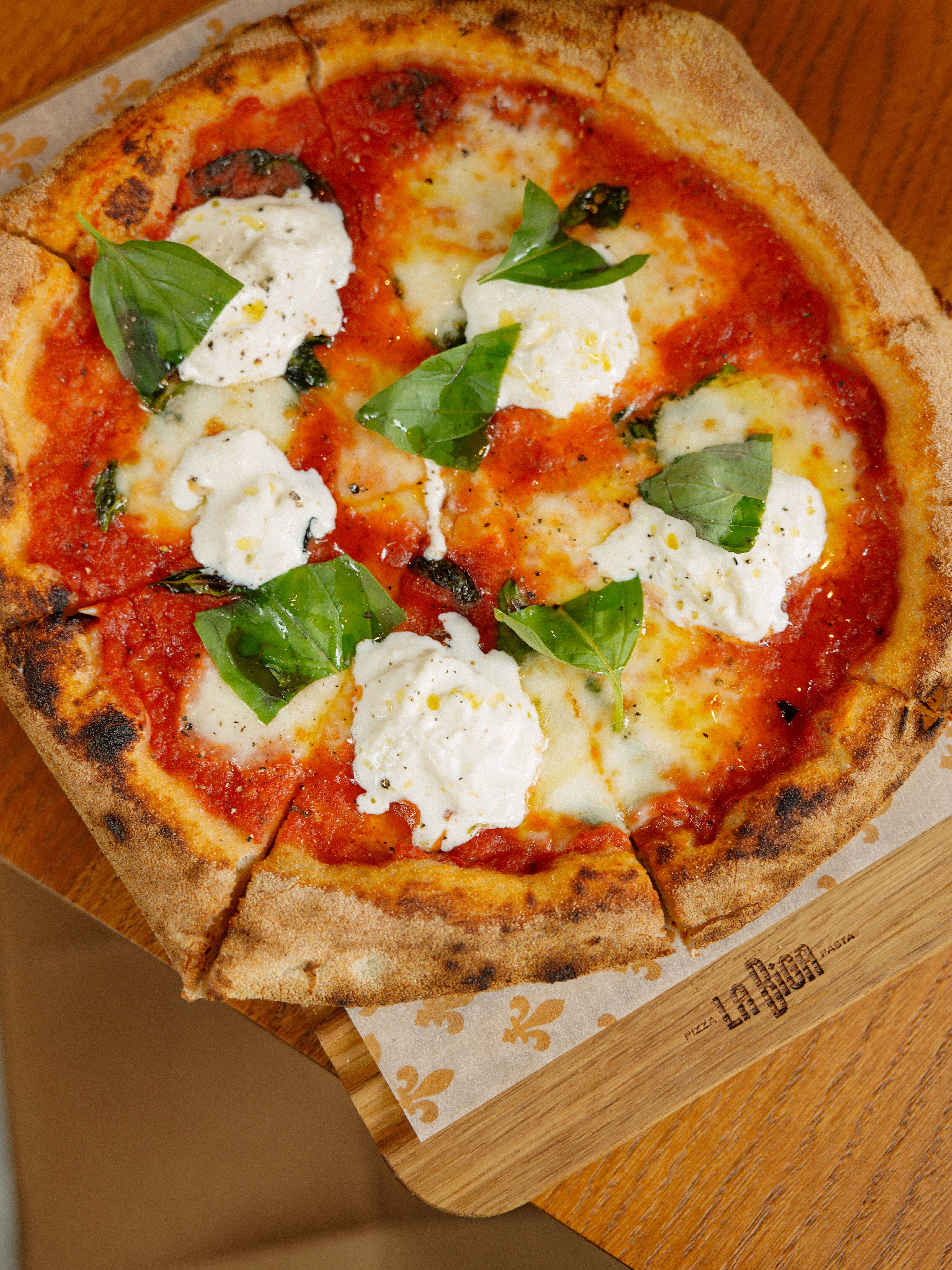 Close-Up Photo of People Getting a Pizza Slice · Free Stock Photo