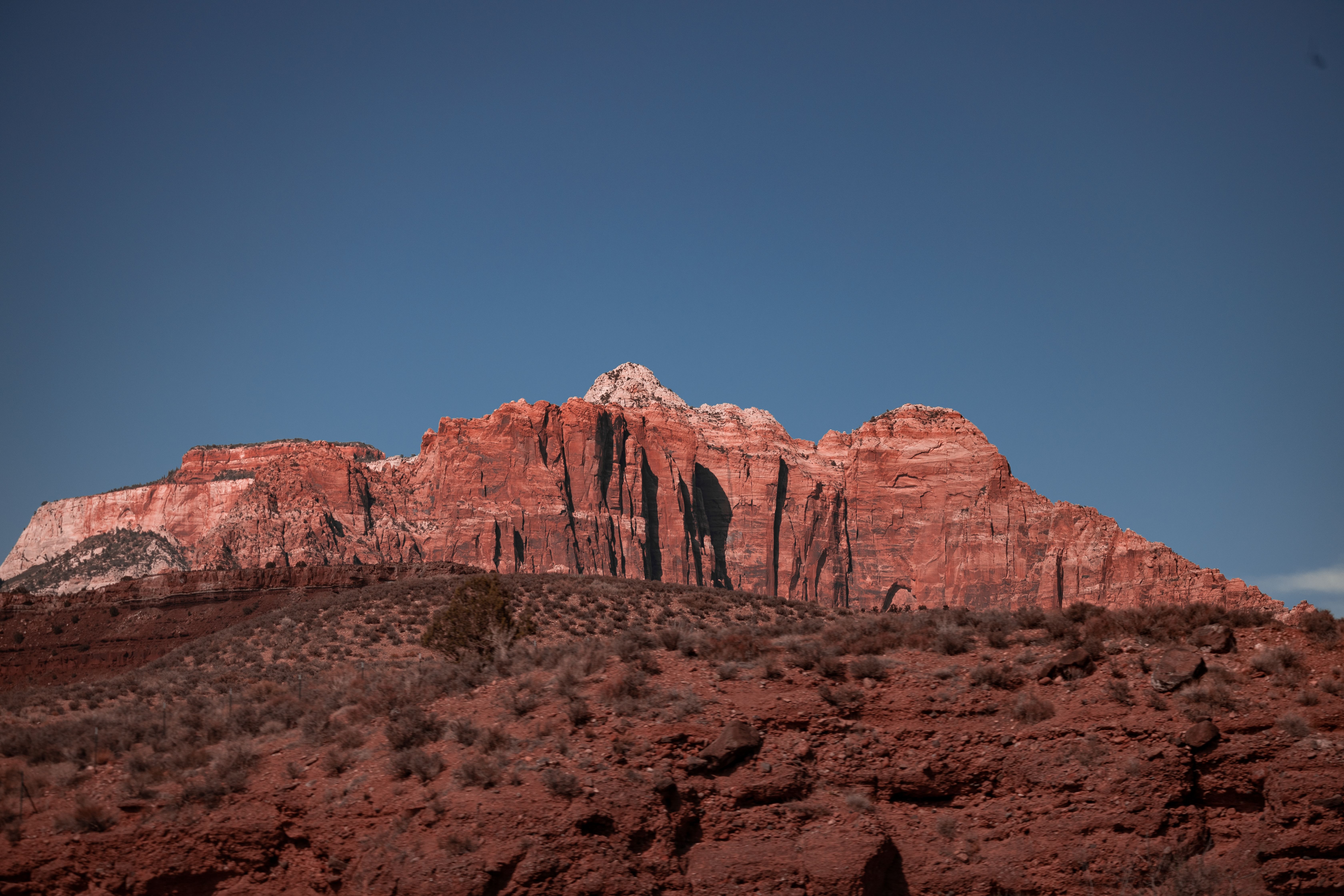 A red rock formation in the desert · Free Stock Photo