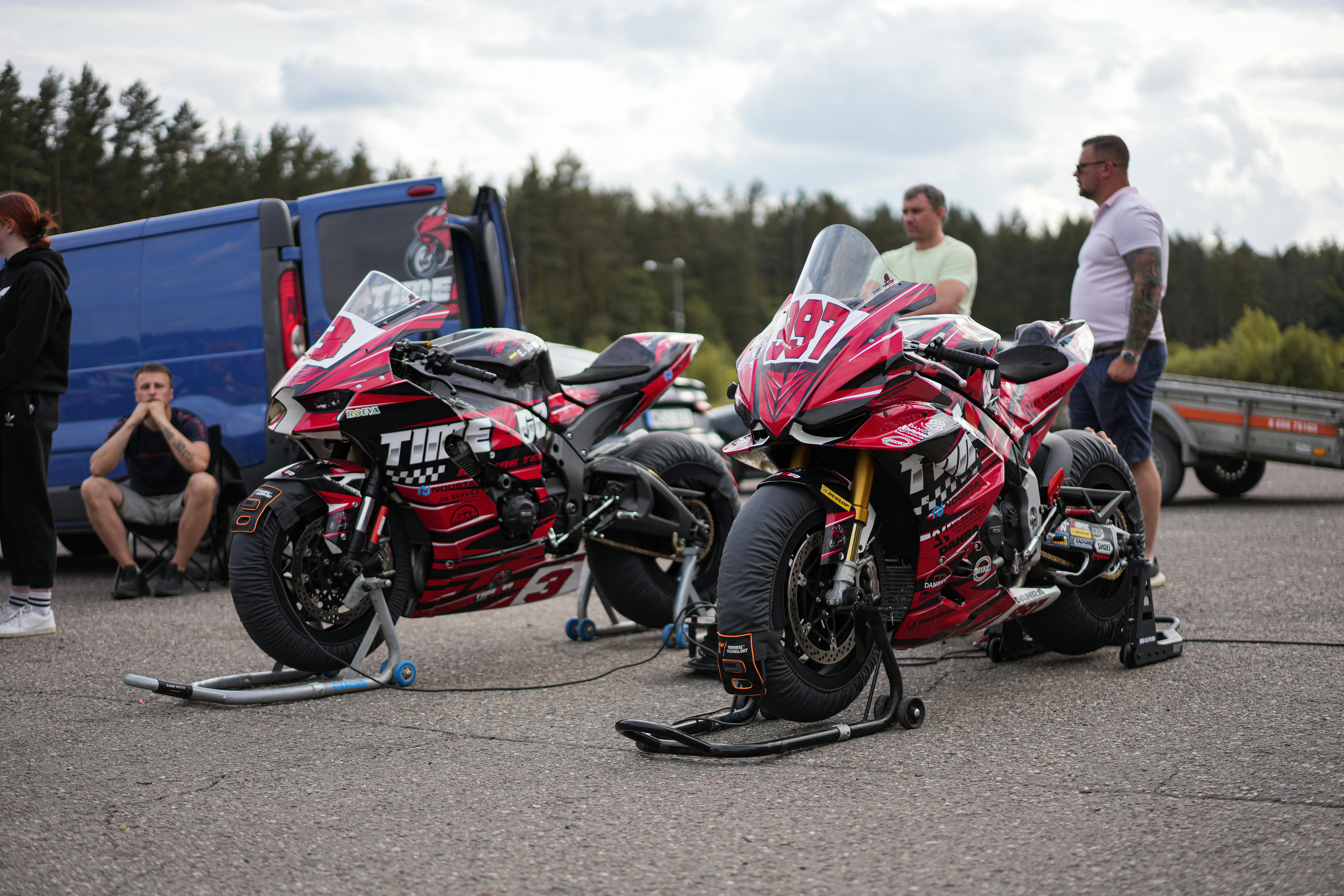 Person Riding Super Bike during Night Race · Free Stock Photo
