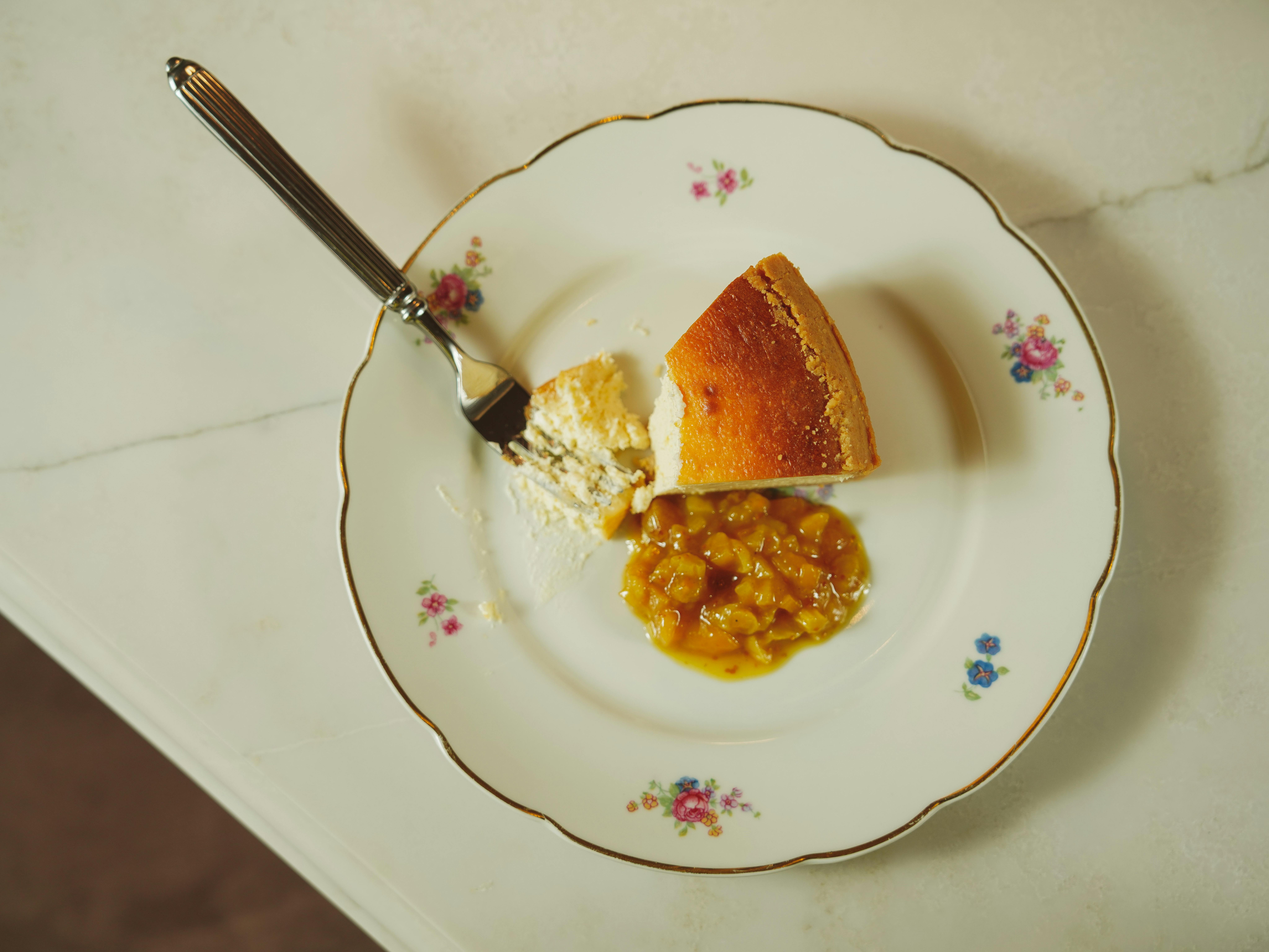 Homemade cheesecake on white plate · Free Stock Photo