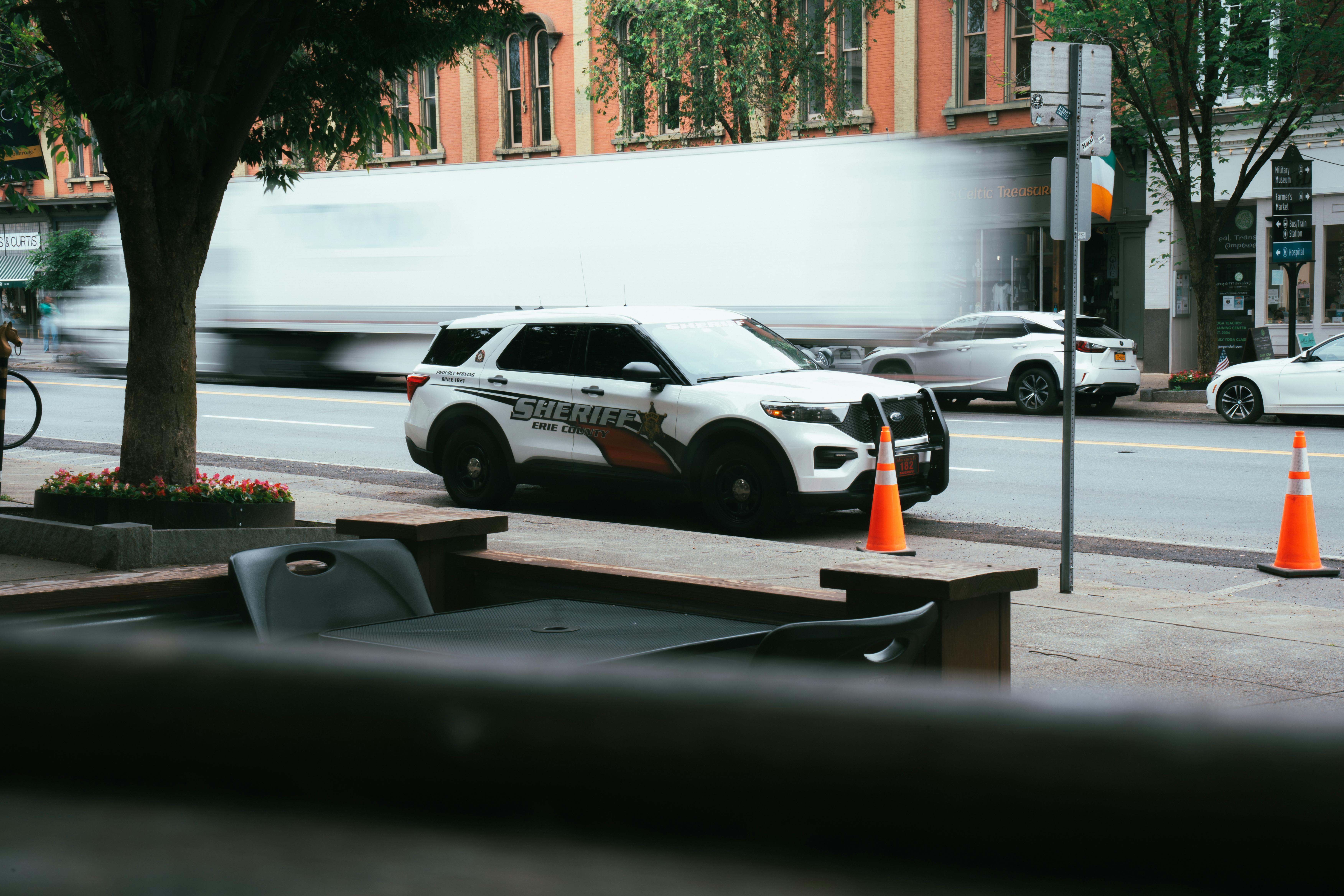 A Police Ford Interceptor on the Street in City · Free Stock Photo