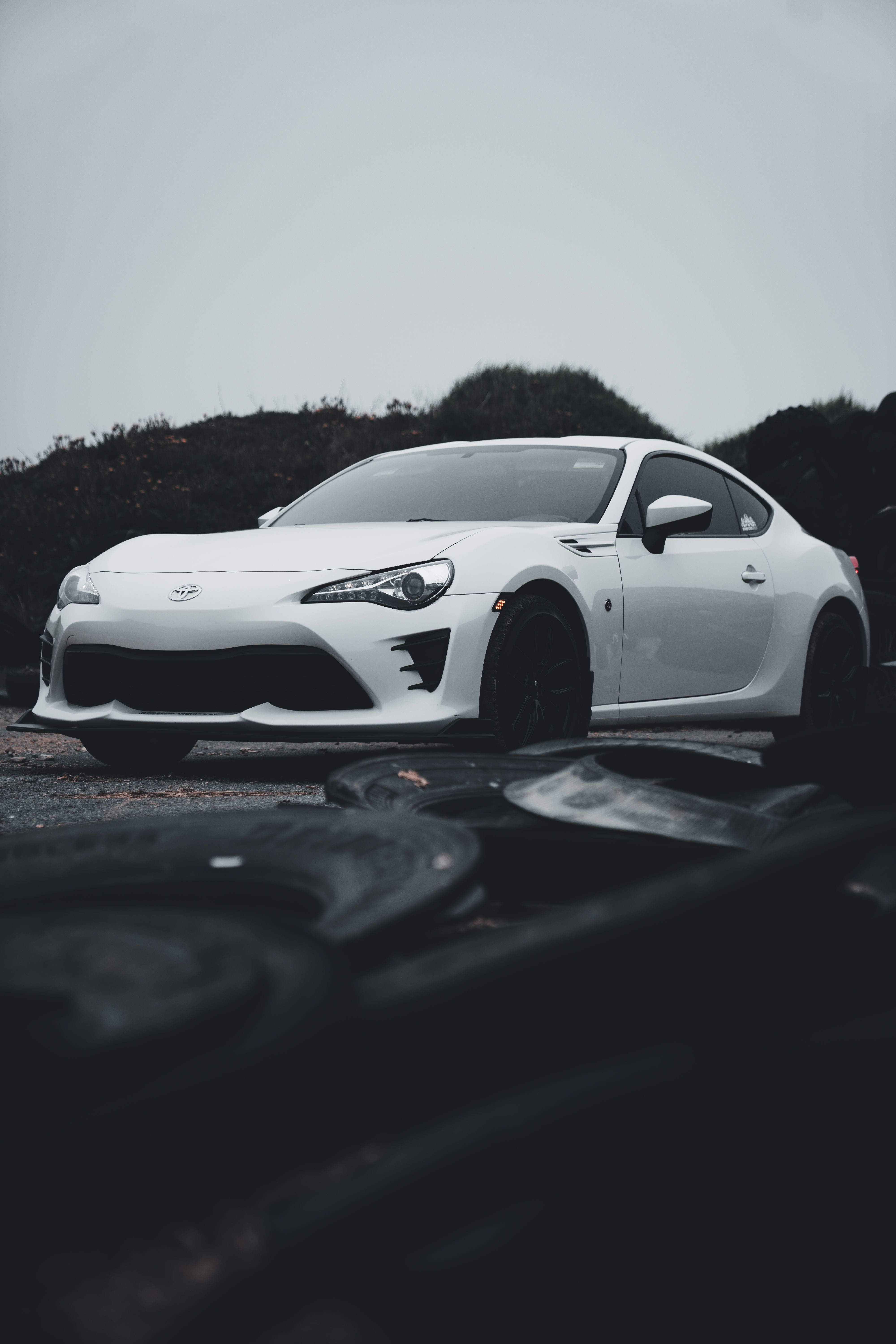 White Toyota Parked in Rain · Free Stock Photo