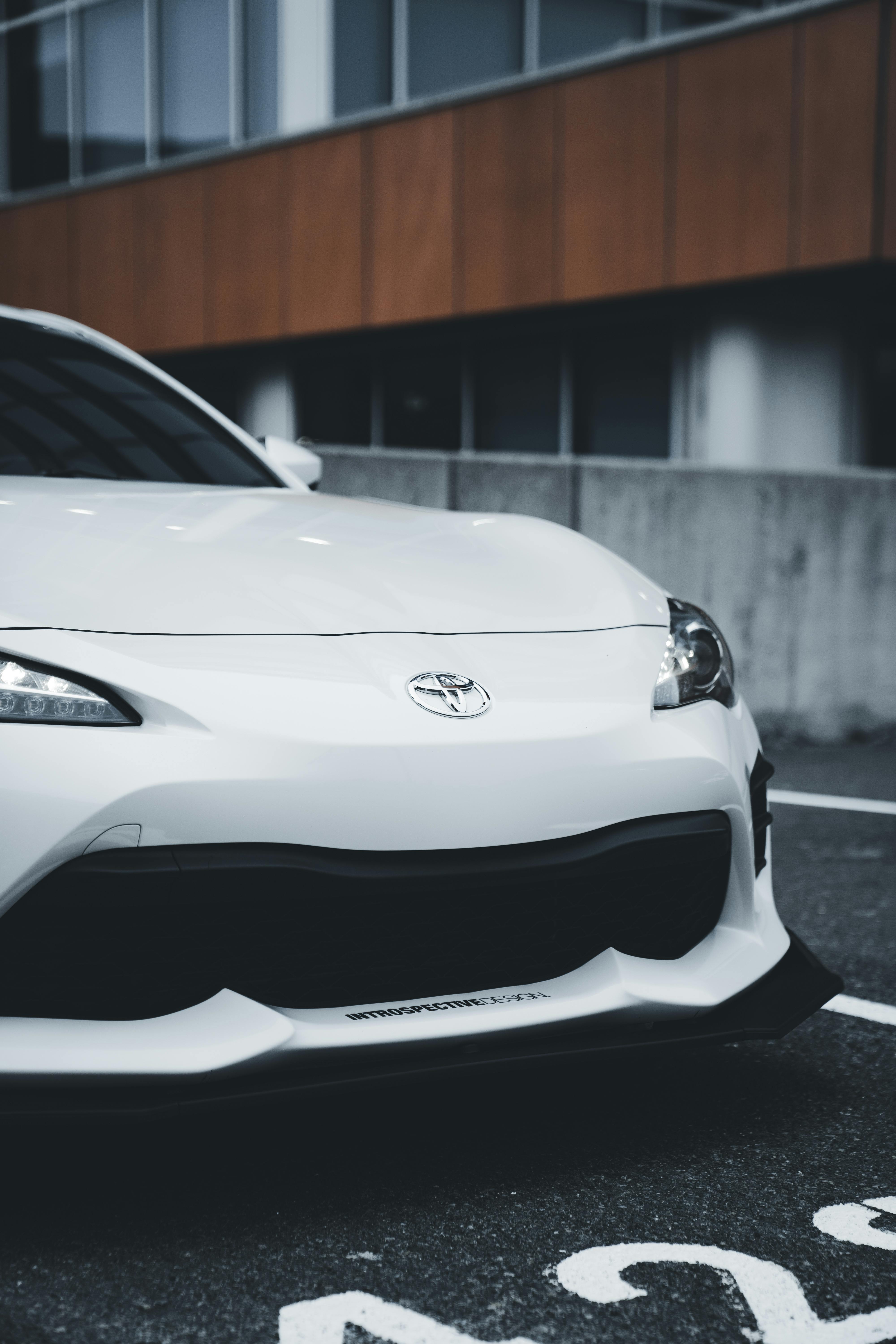 White Toyota 86 Sports Car Parked in a Residential Building Yard · Free ...
