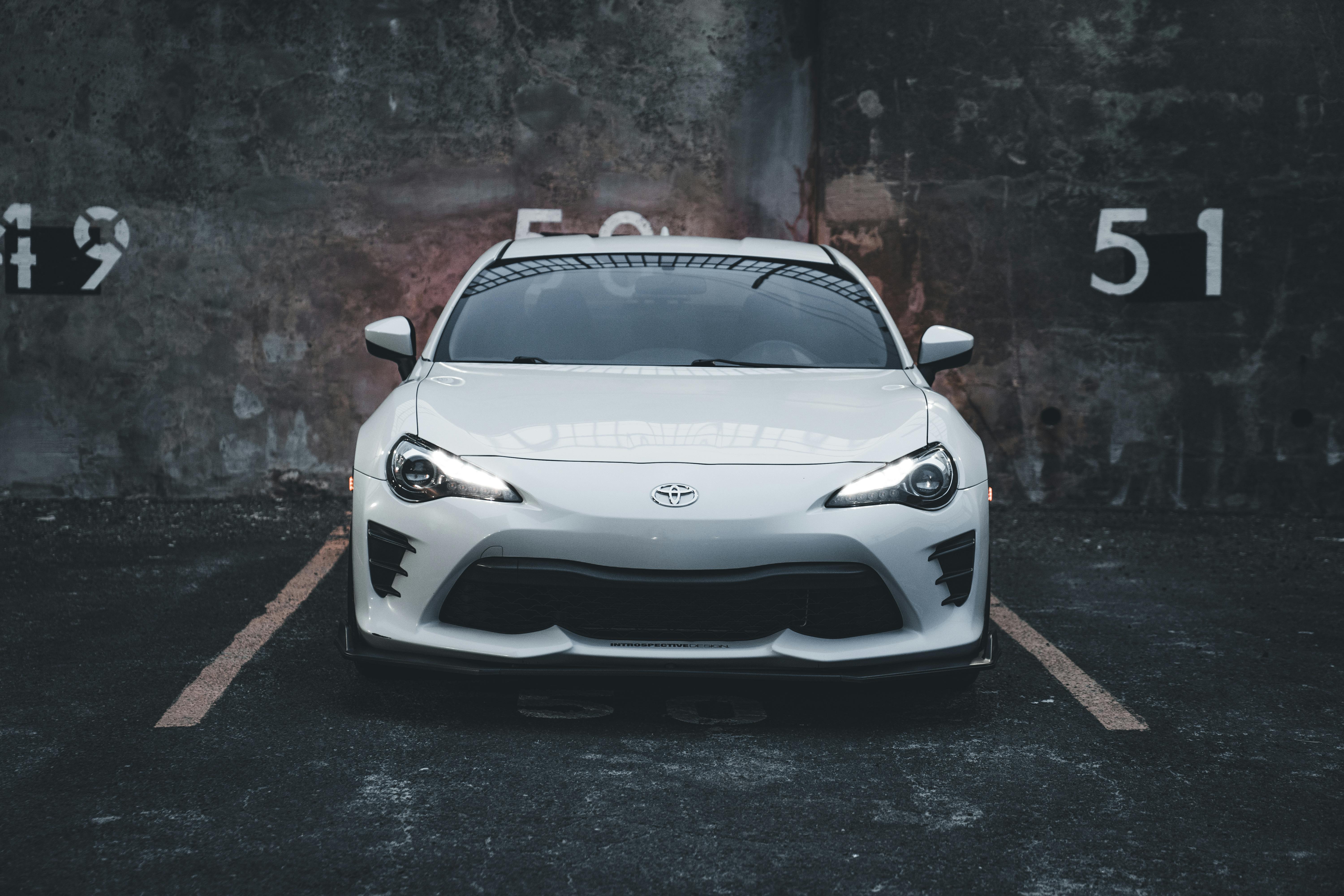 A Red Toyota GR86 on an Asphalt Road · Free Stock Photo