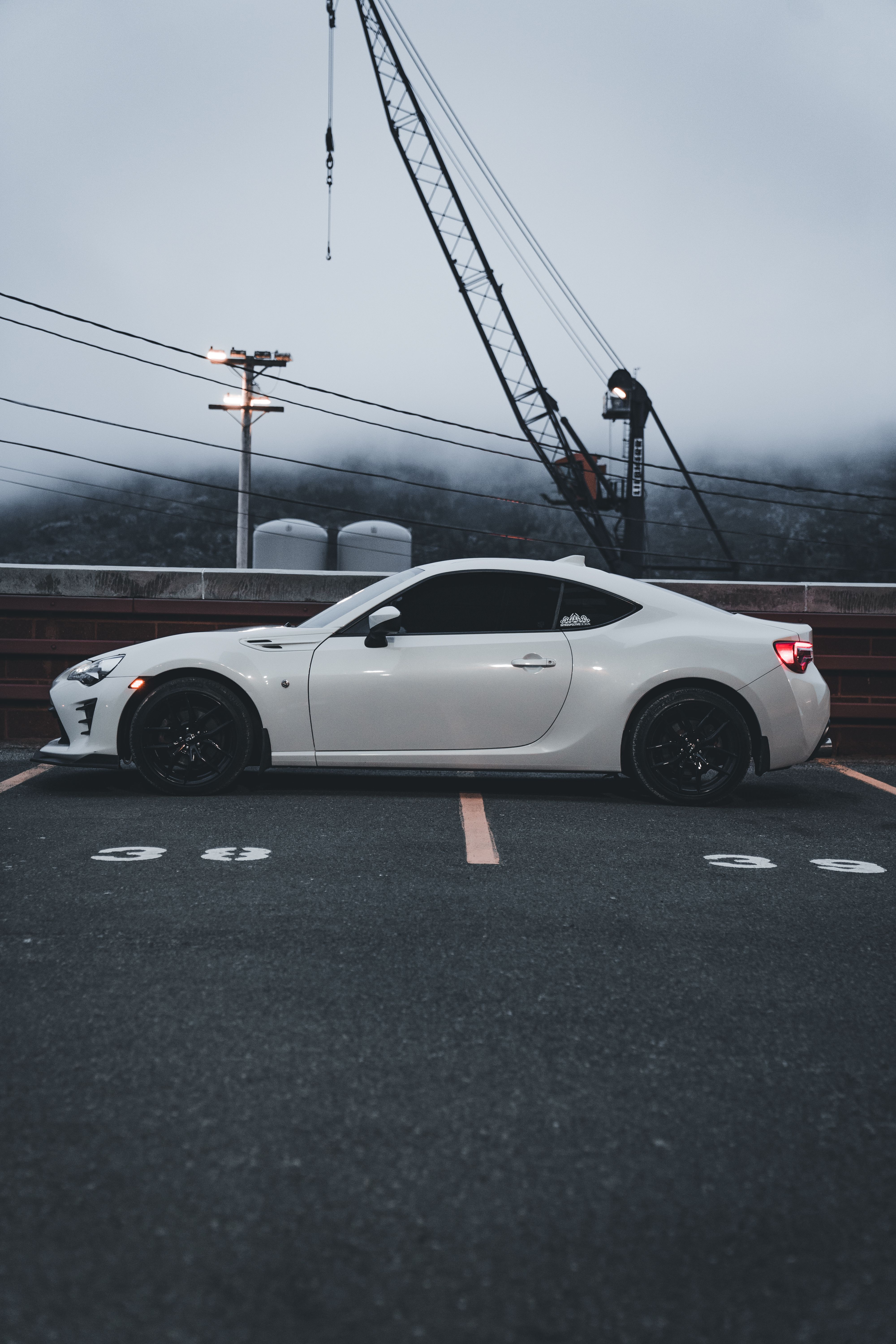Back of a Red Toyota GR86 on an Asphalt Road · Free Stock Photo