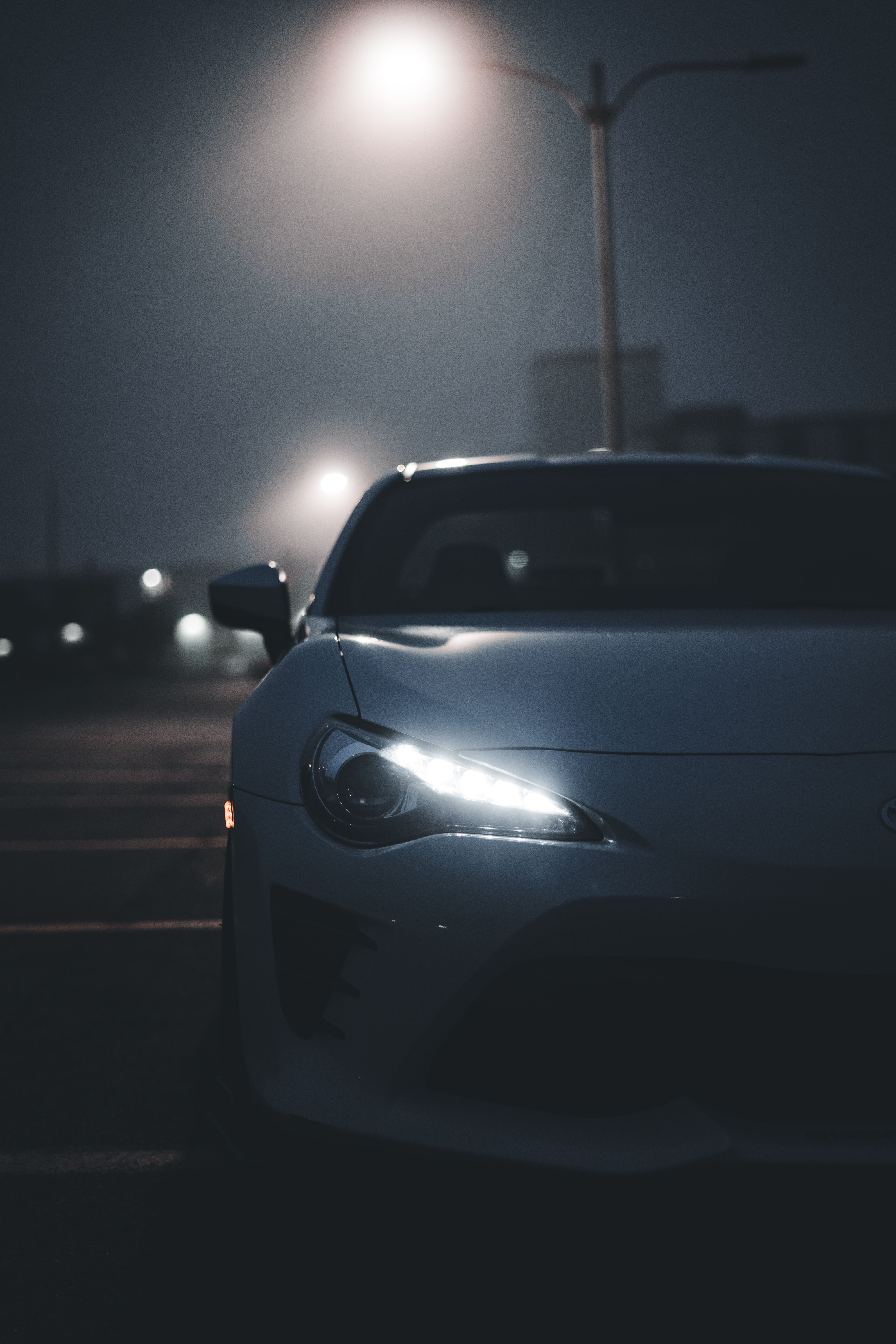 White Toyota GT86 on a Parking Lot at Night · Free Stock Photo