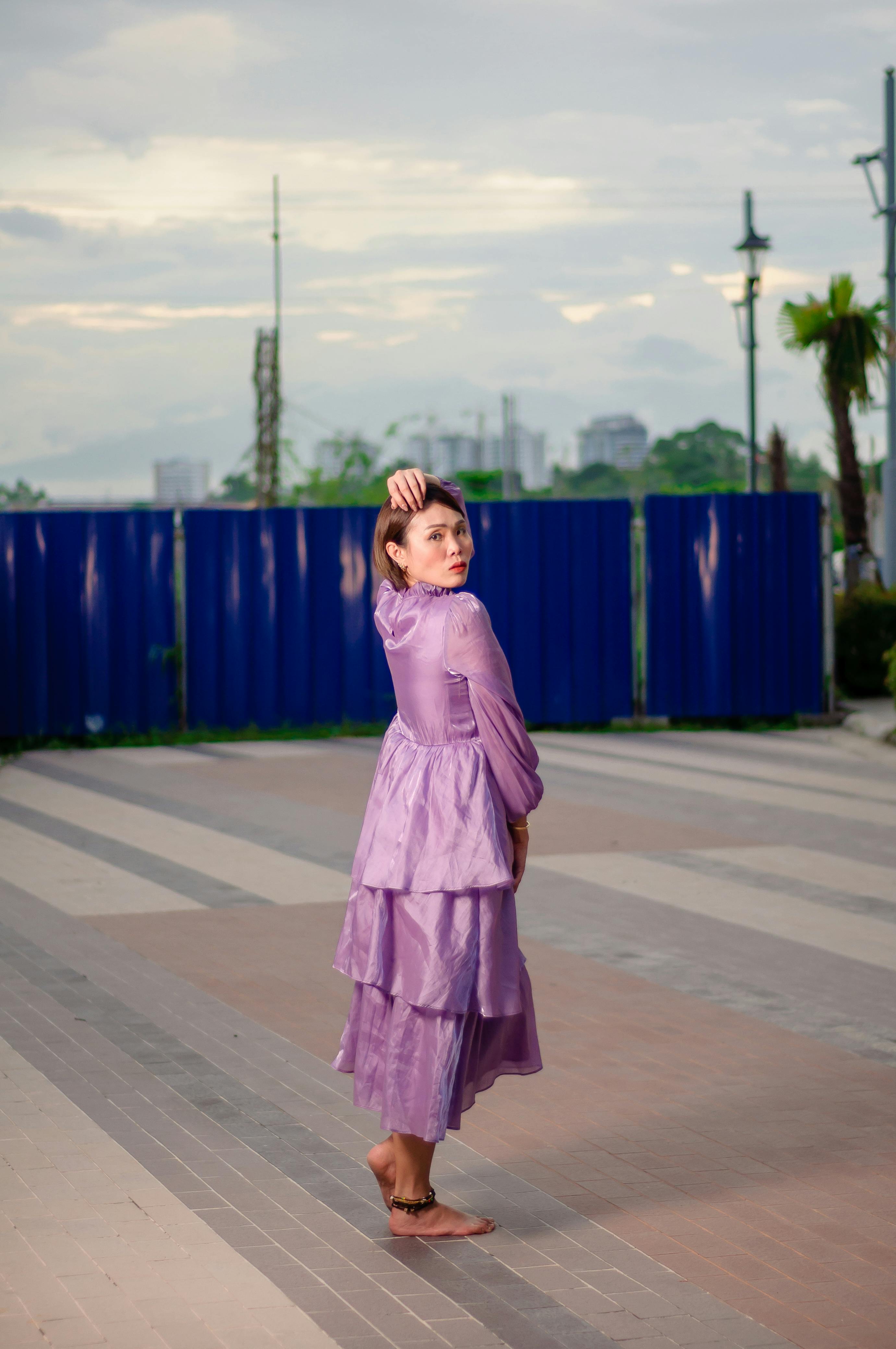 A Woman with One Shoe Worn · Free Stock Photo