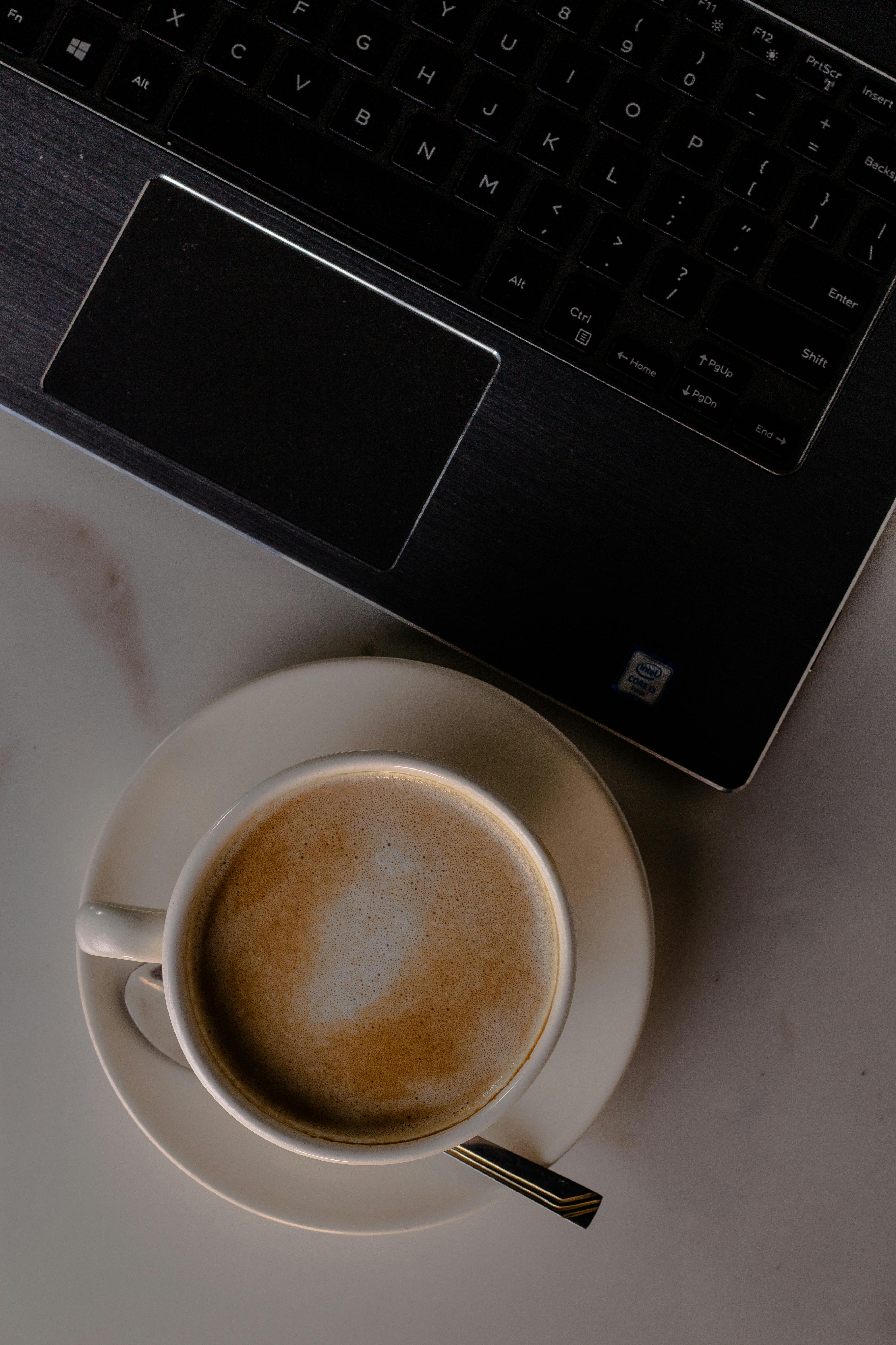 Coffee near Laptop · Free Stock Photo
