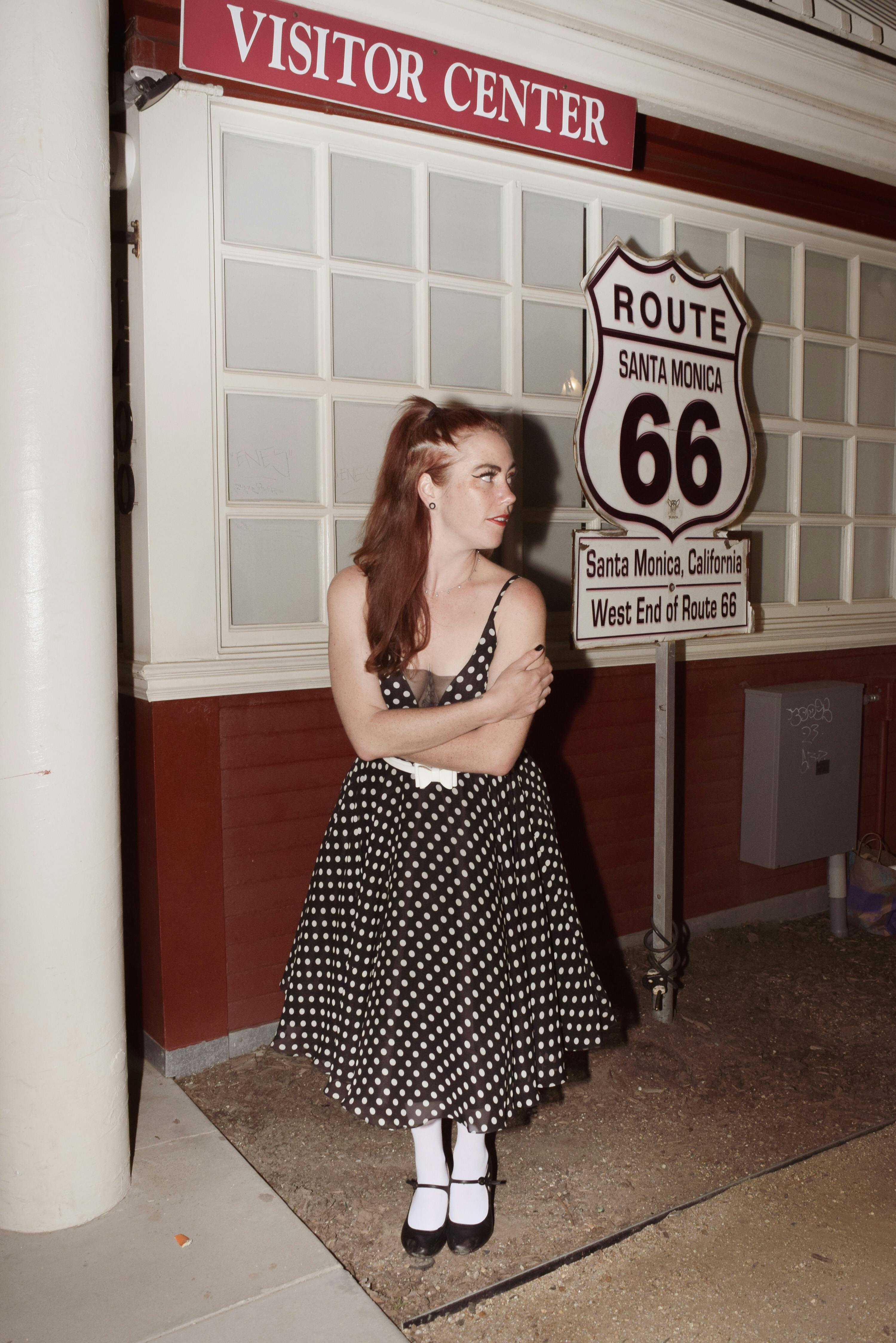 Woman in Dress by Route 66 Visitor Center · Free Stock Photo