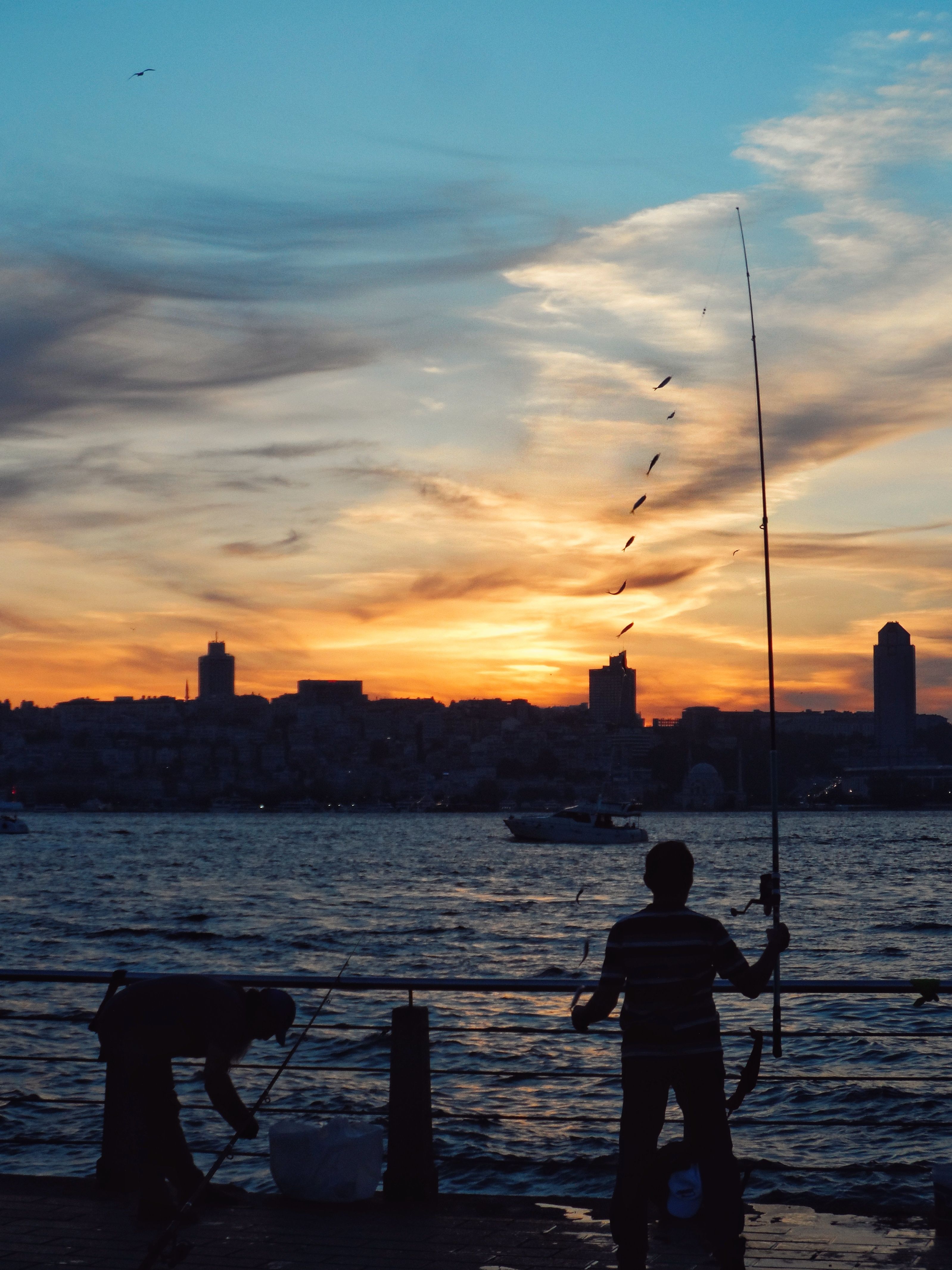 Fishermen at Sunset · Free Stock Photo