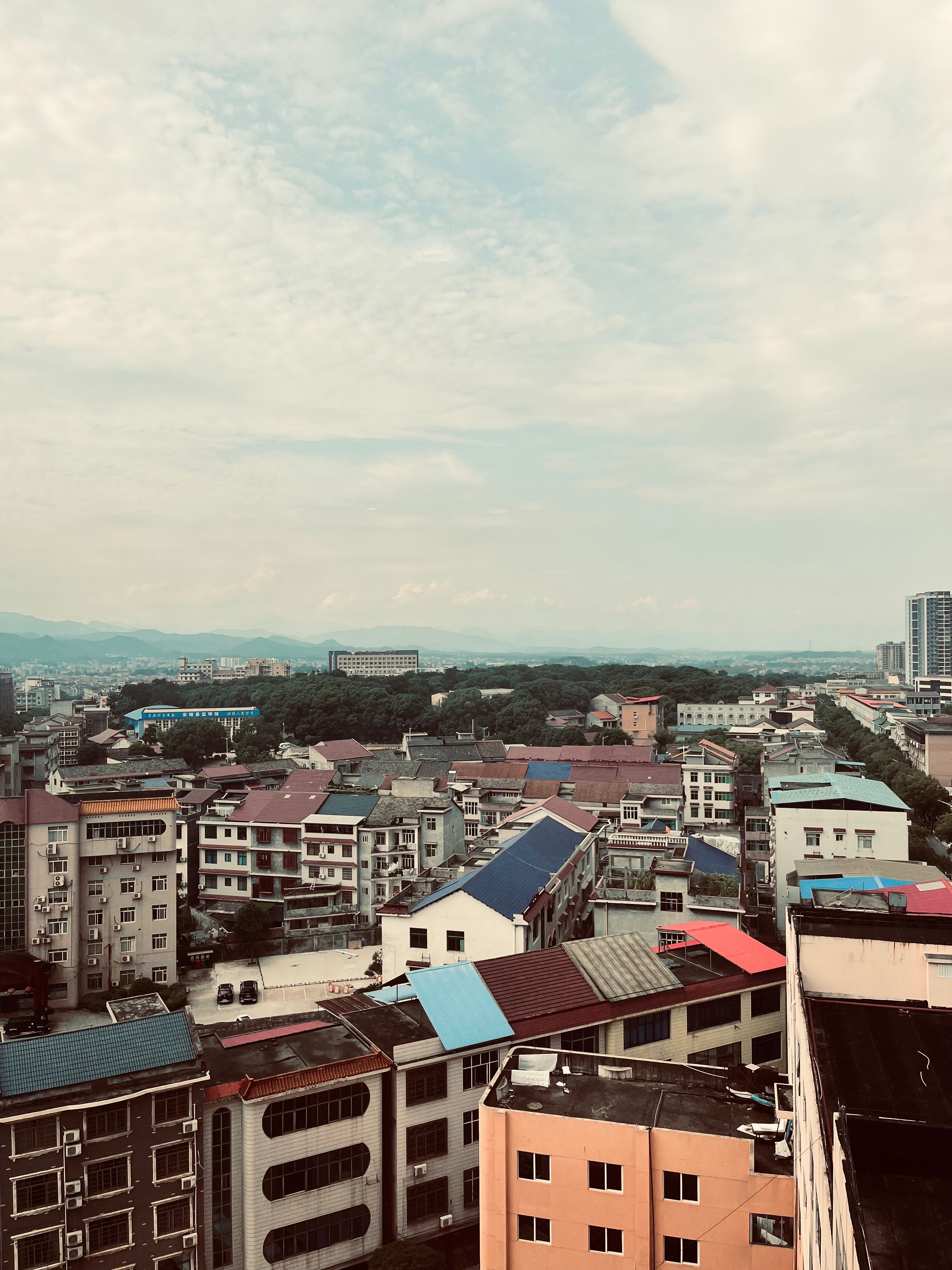 Overcast over Roofs of Buildings in Town · Free Stock Photo