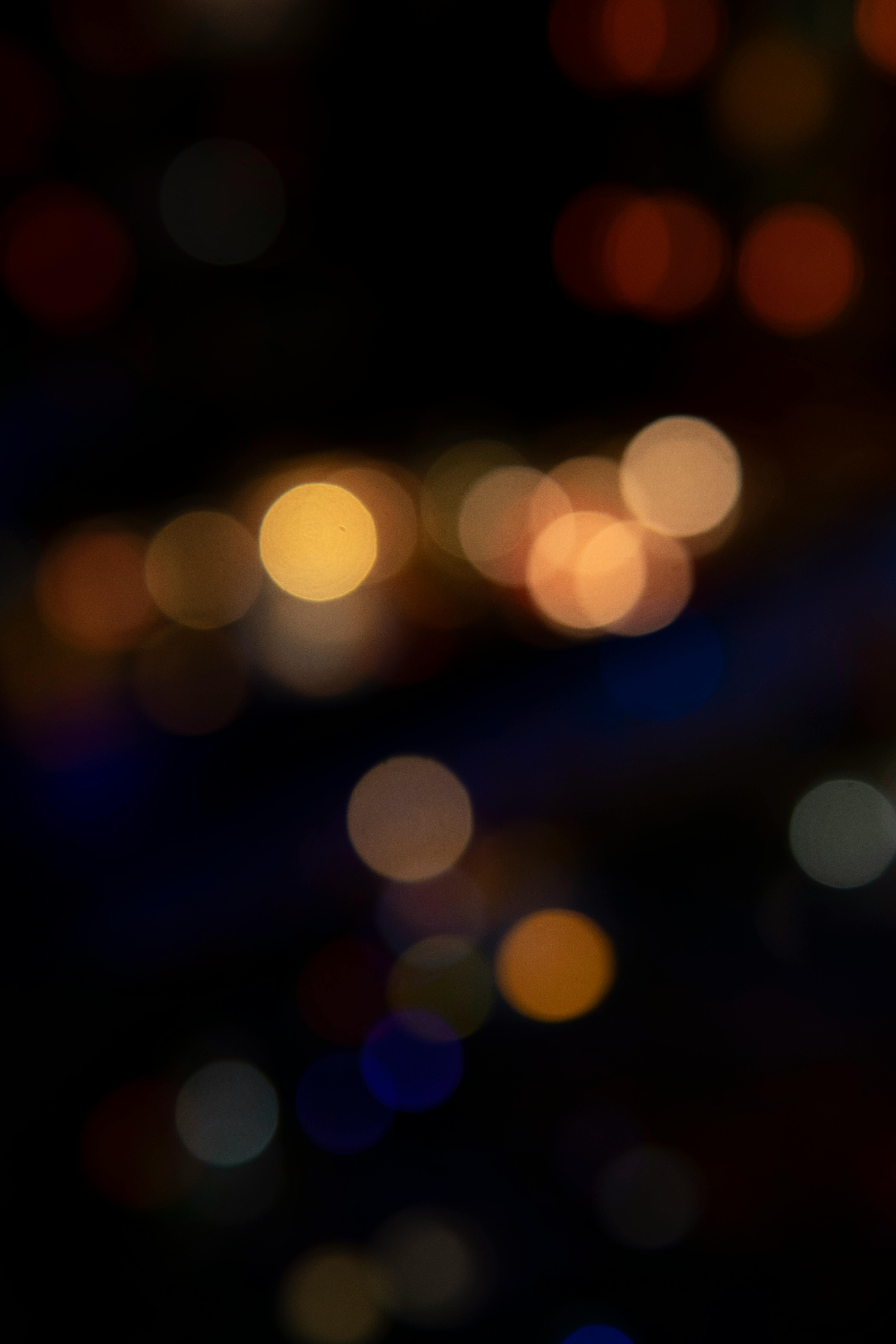 Lens Flares of Urban Lights at Night · Free Stock Photo