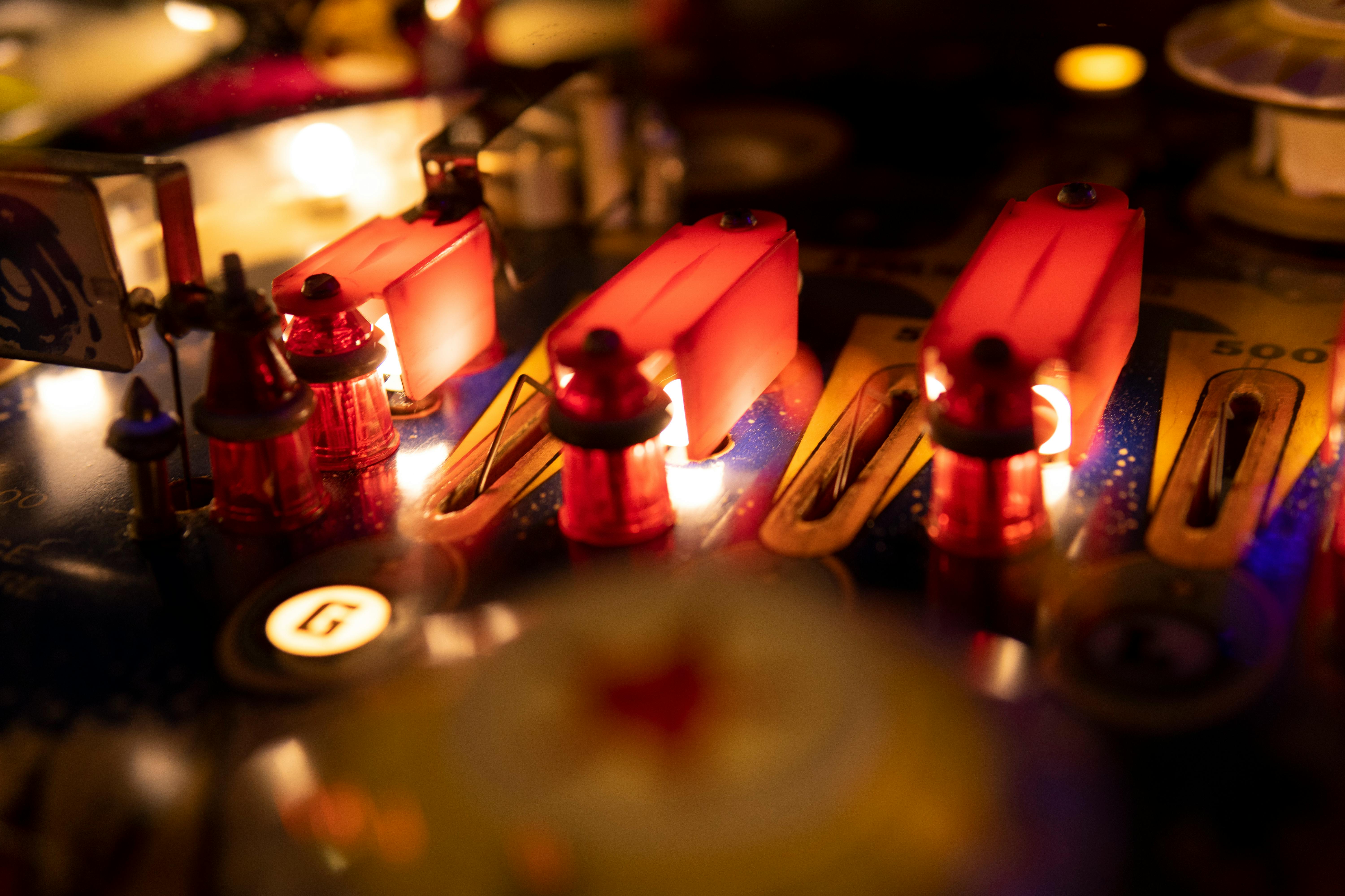 Close-up of Illuminated Elements of an Arcade Machine · Free Stock Photo