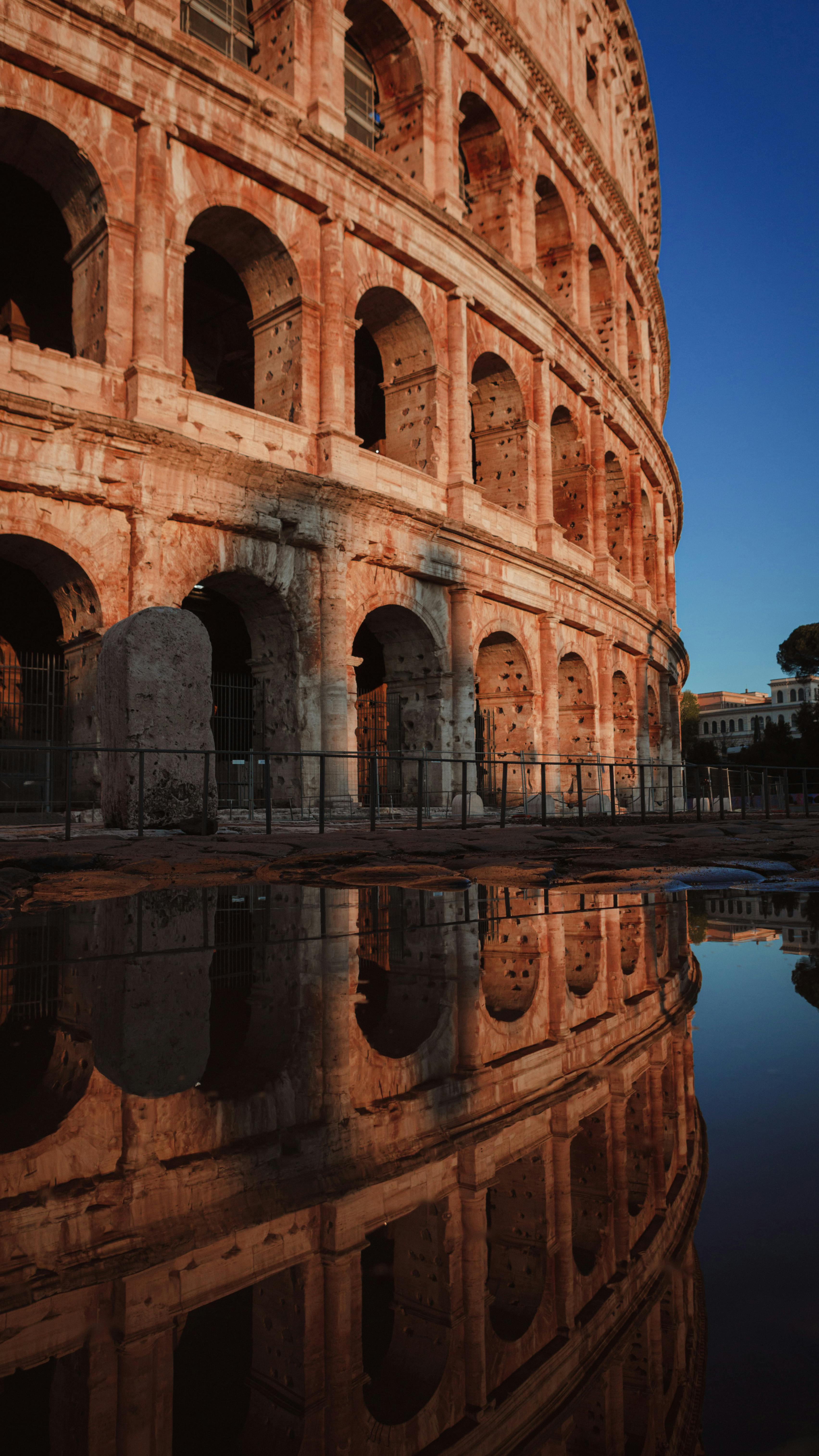 Colosseum Reflected in the River · Free Stock Photo