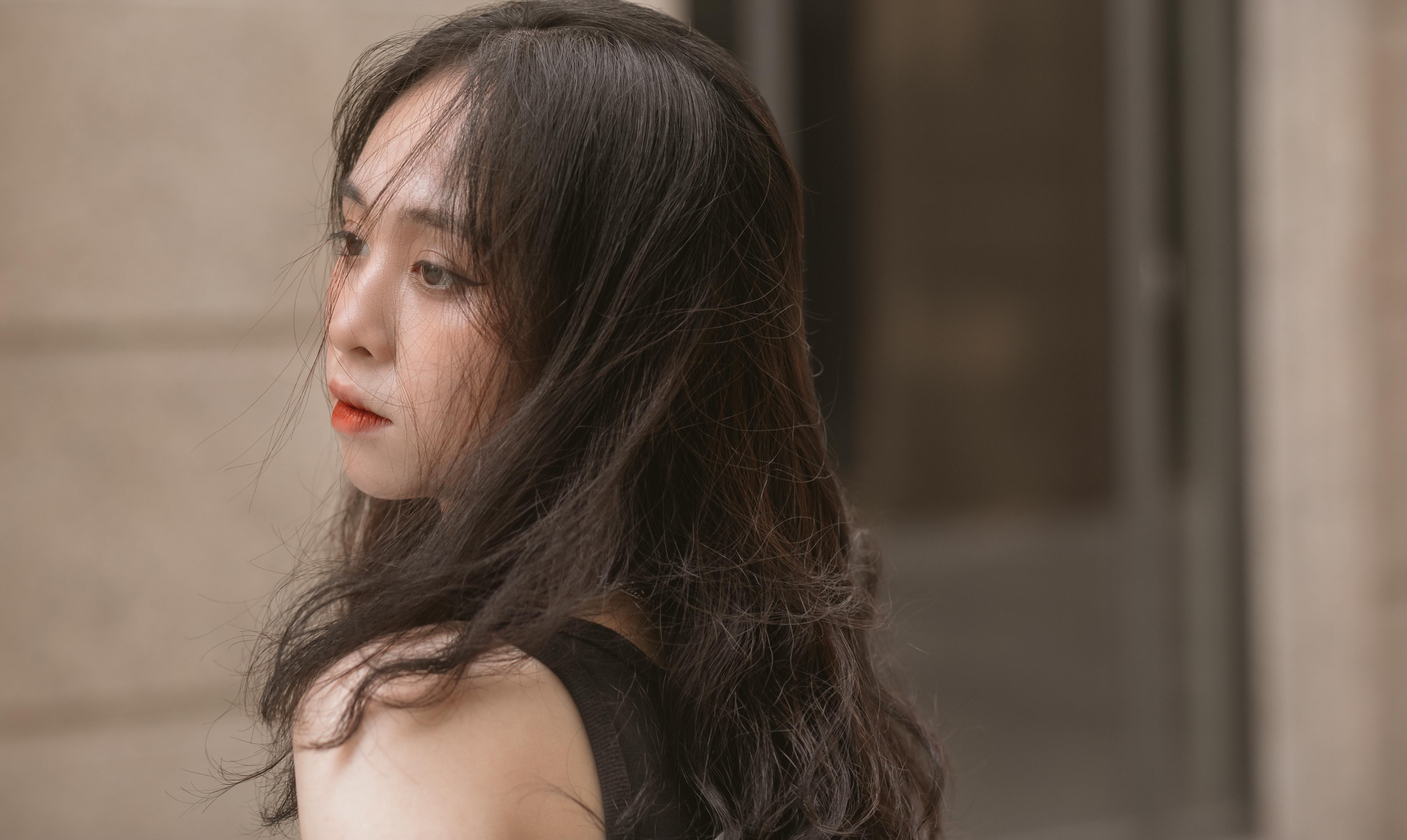 A Woman Wearing an Off Shoulder Top · Free Stock Photo