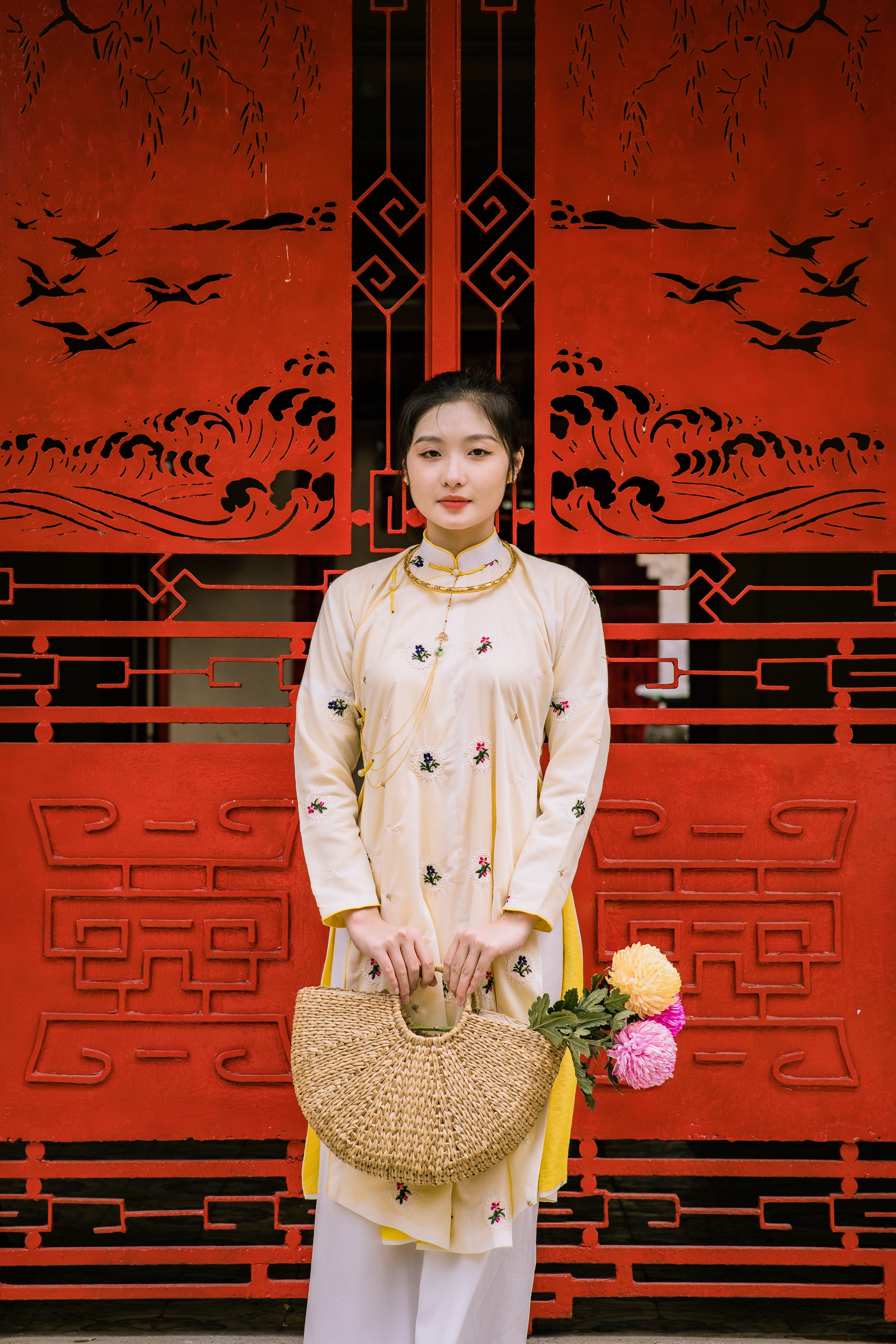 Woman Posing in Traditional Clothing among Wax Candles · Free Stock Photo