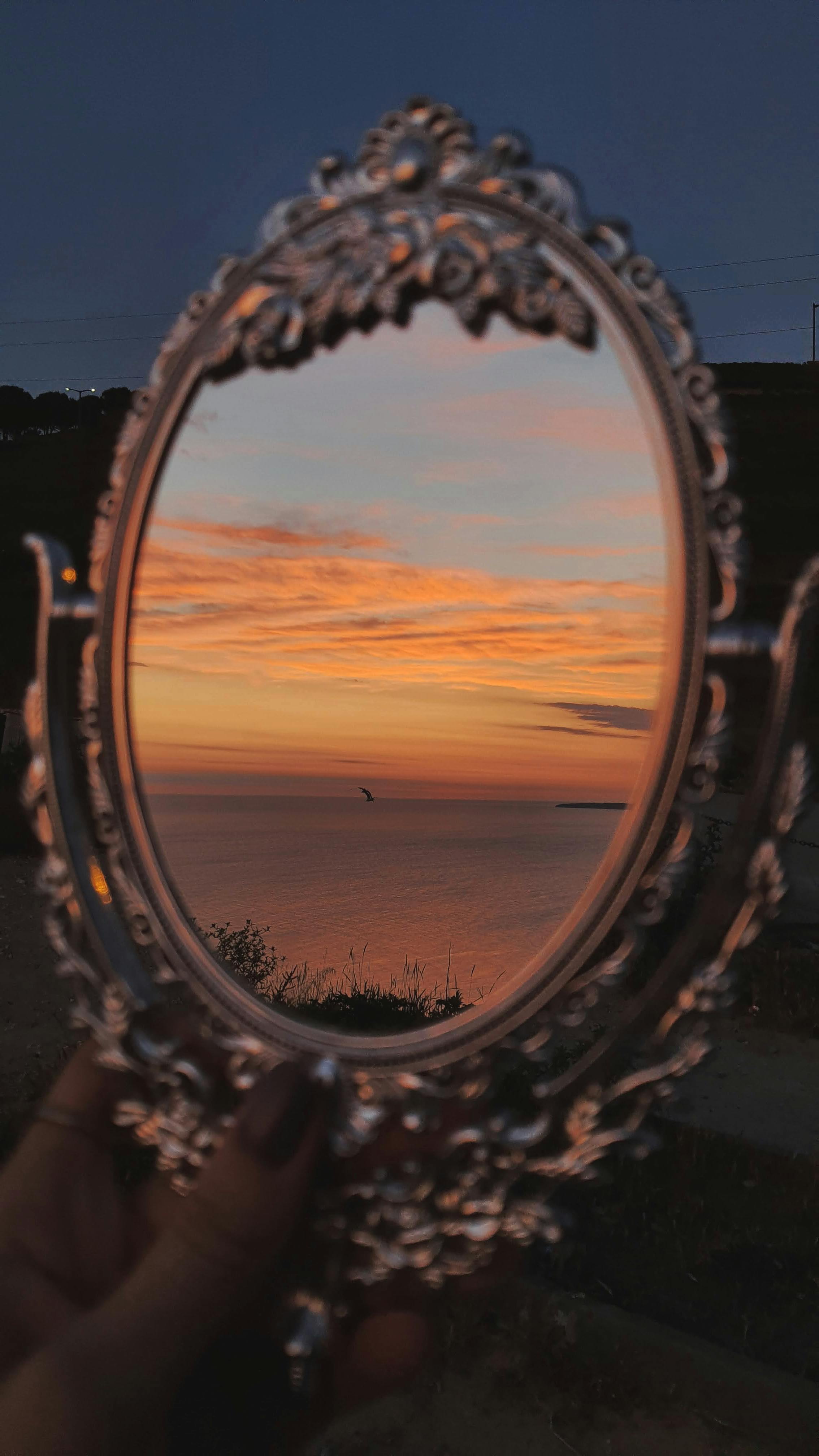Sunset Reflecting in Mirror · Free Stock Photo