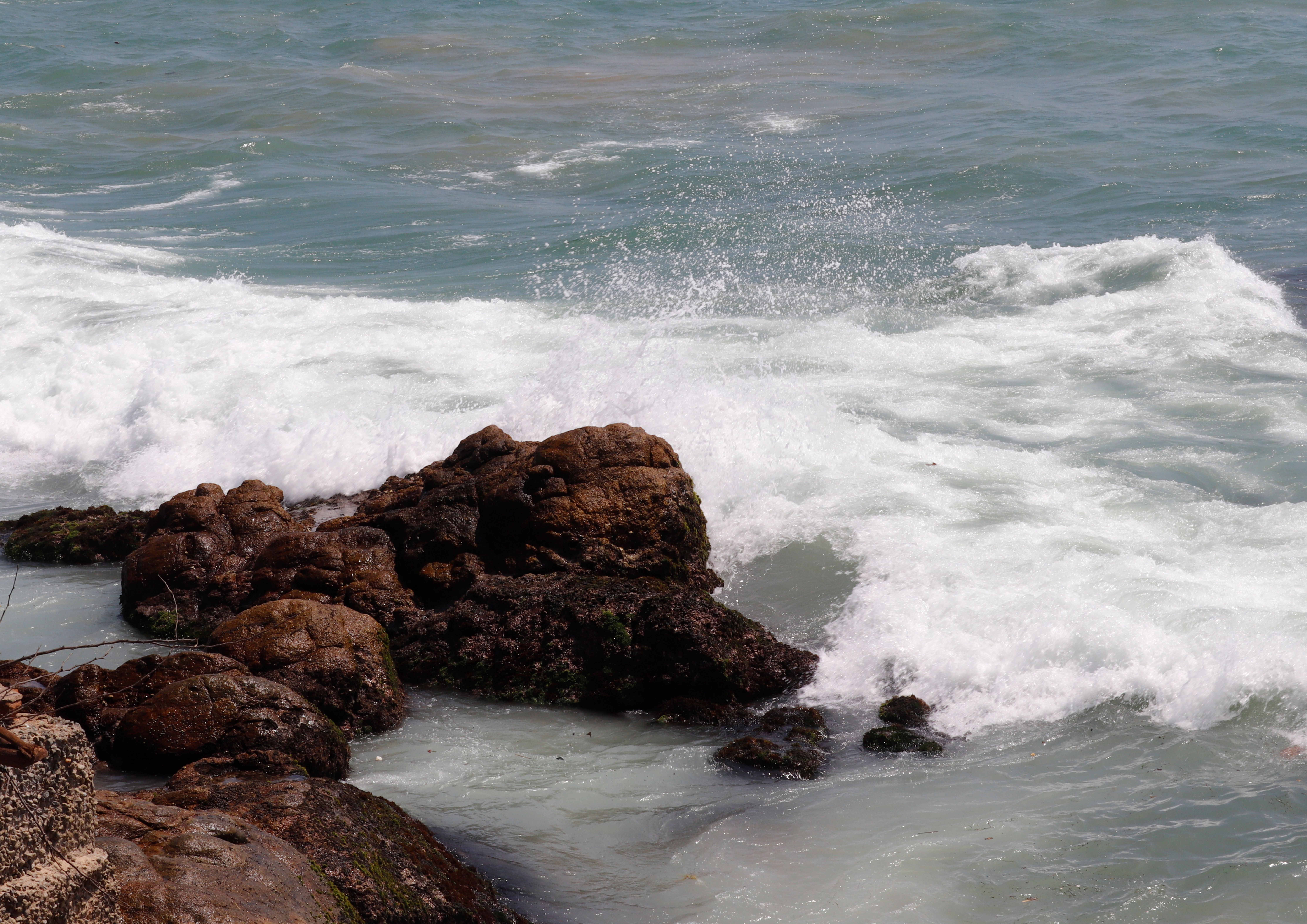 Sea Waves Splashing against Rocks · Free Stock Photo